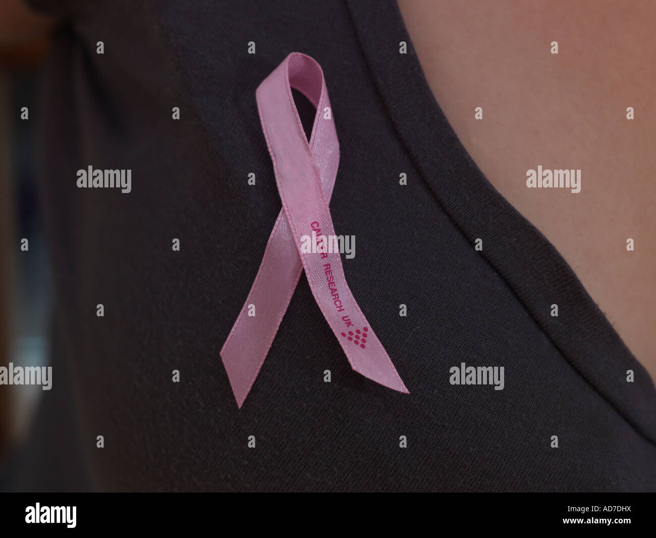 Close up of a Looped Charity Ribbon Being Worn Stock Photo - Alamy
