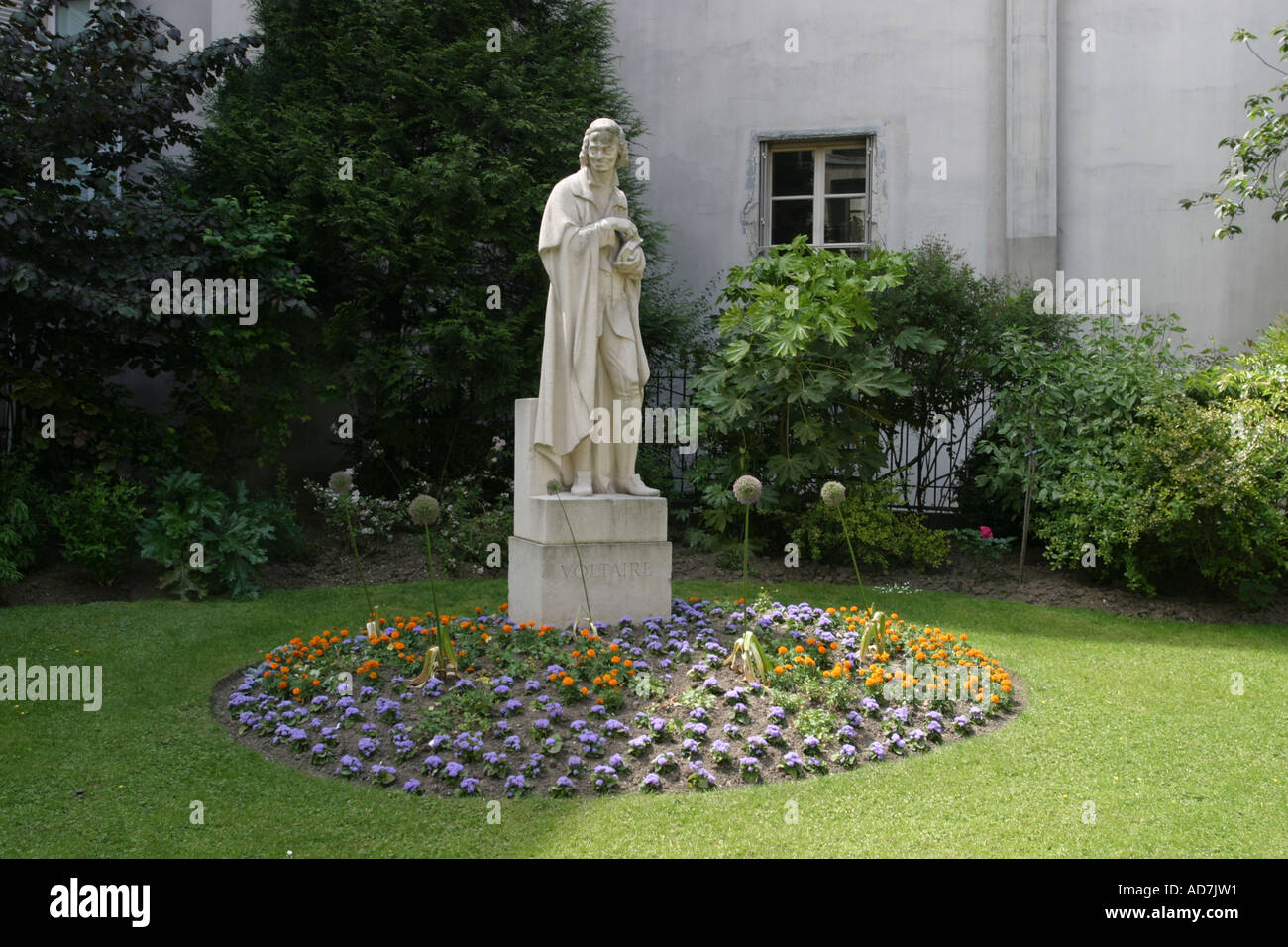 Statue of Voltaire (1694-1778) near Institut de France Paris France ...