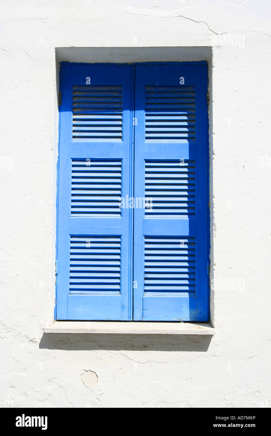 mediterranean style bright blue window and white walls Stock Photo - Alamy