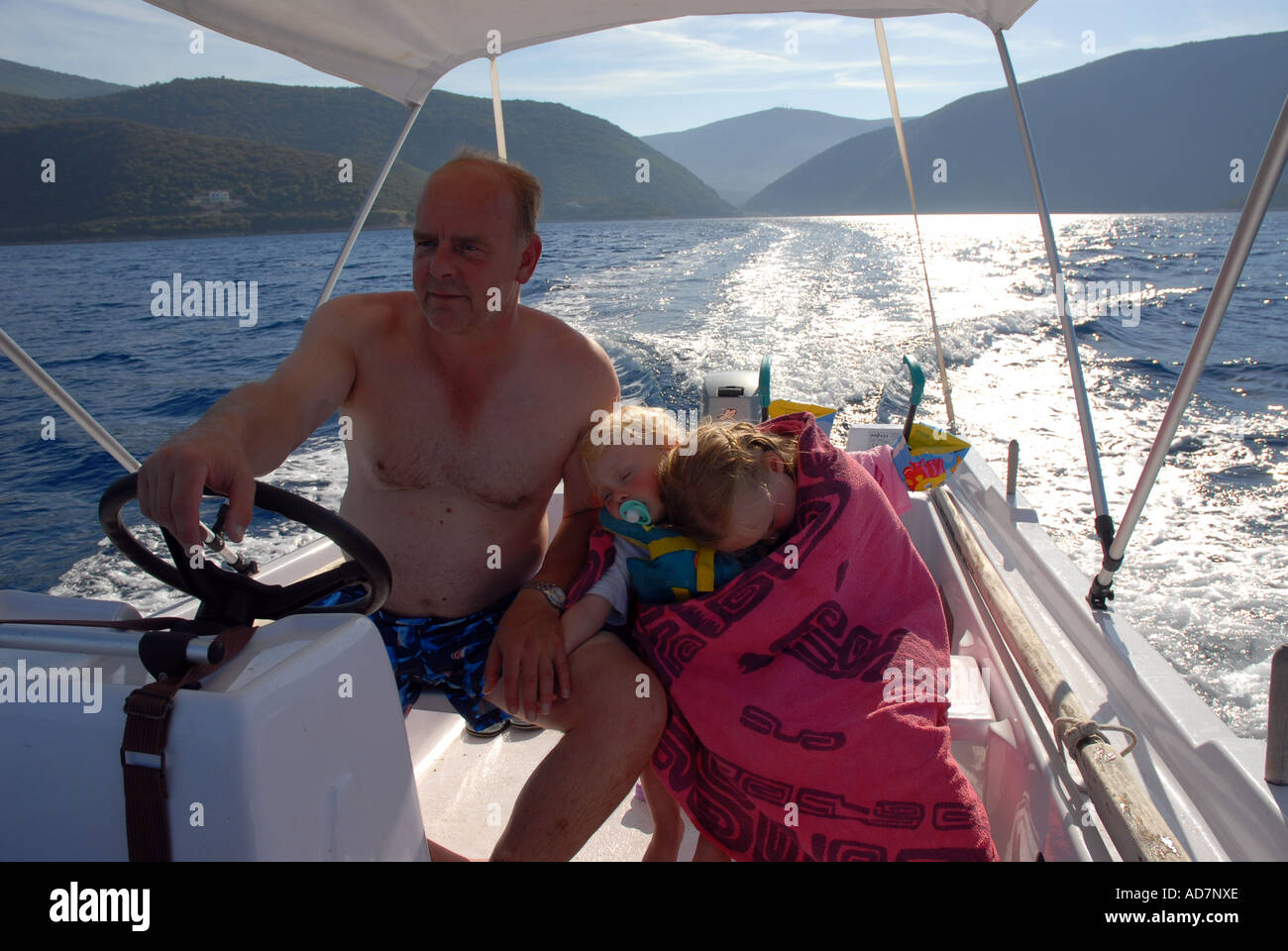 Family speedboat greek islands Stock Photo - Alamy