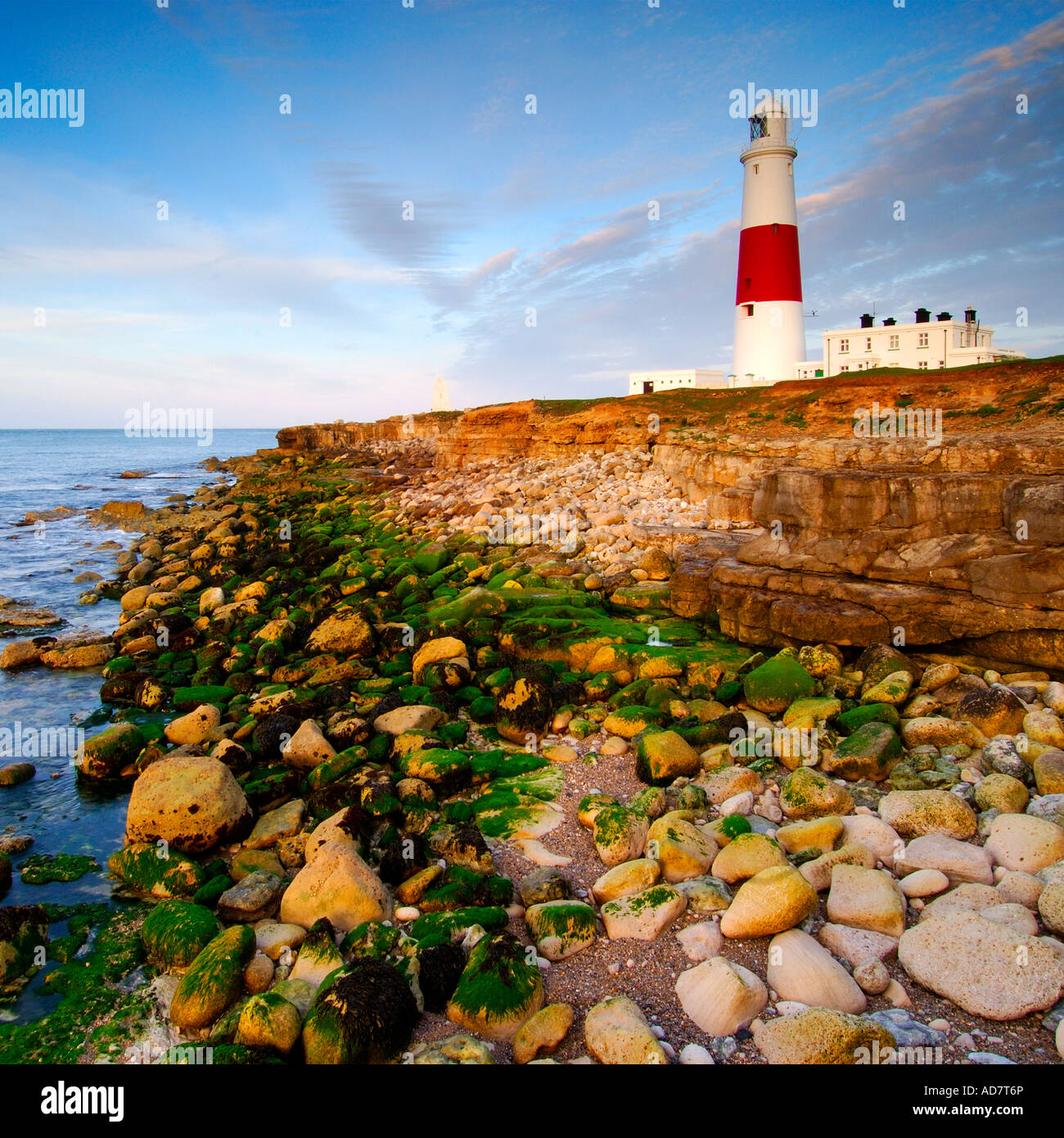 Portland Bill lighthouse at dawn taken from the clifftop above the ...