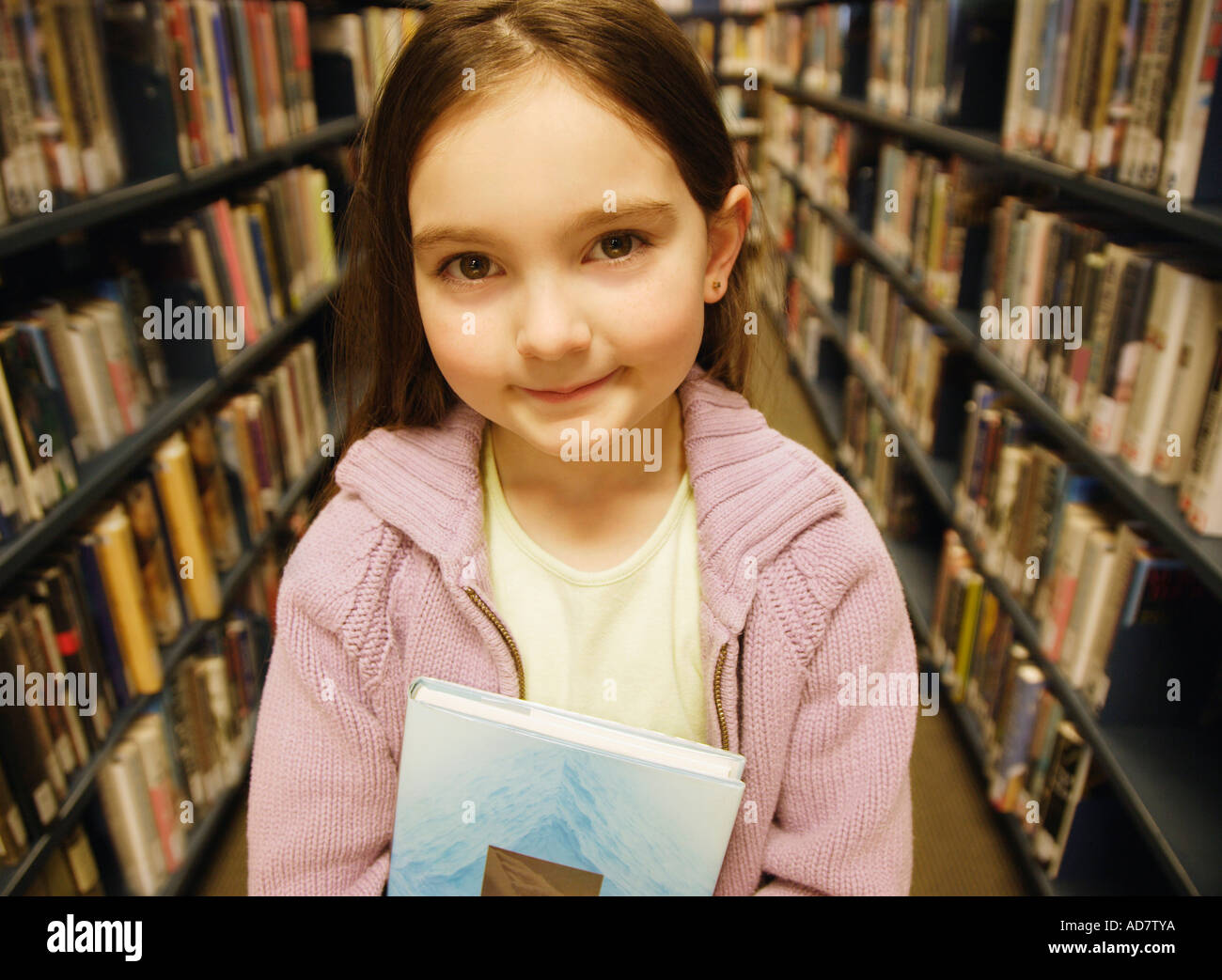 School girl at a library Stock Photo - Alamy