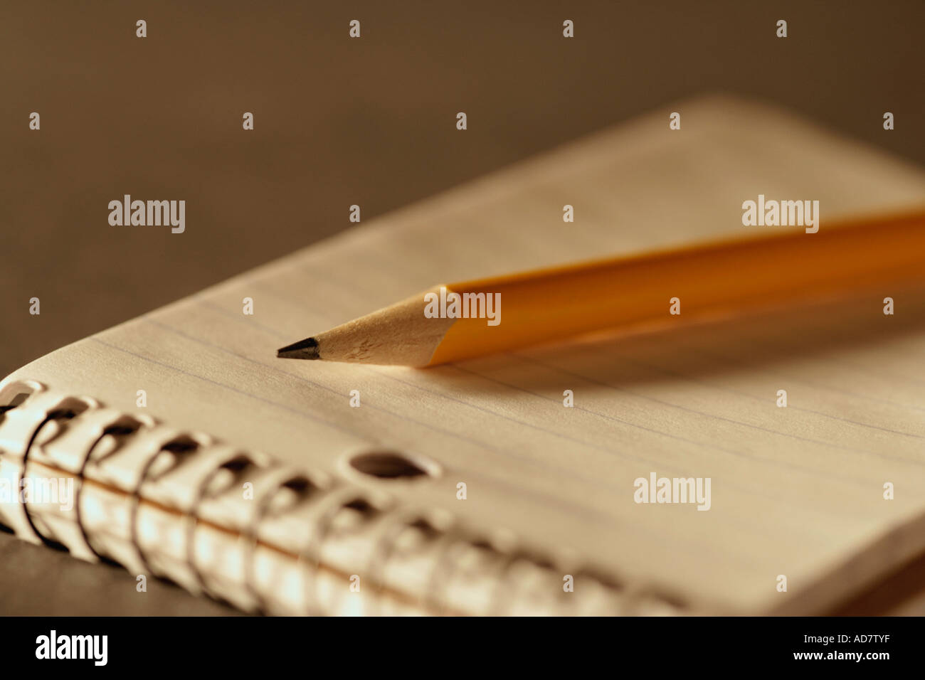 Pencil on a pad of paper Stock Photo - Alamy