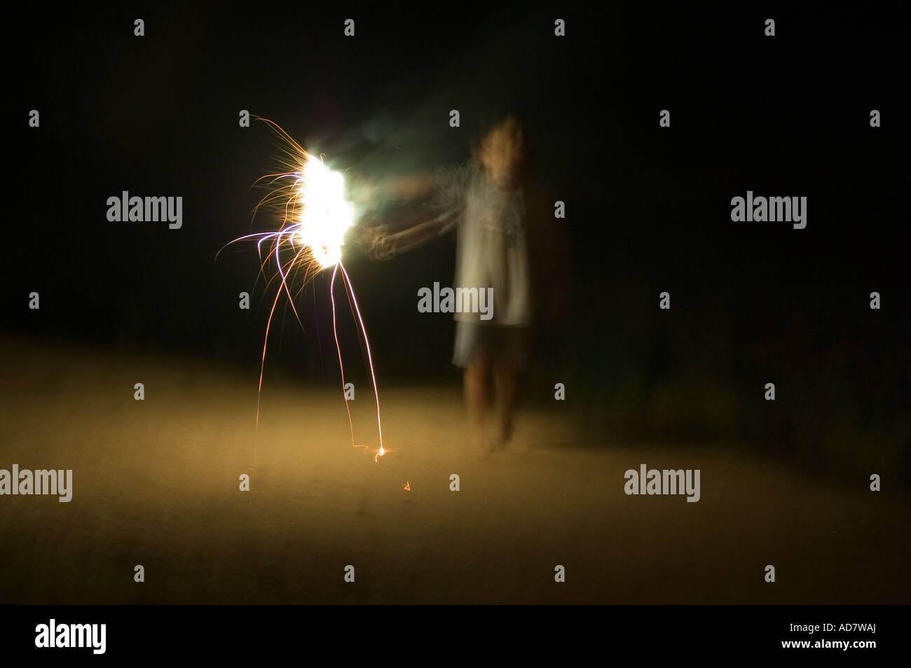 Child with fireworks hi-res stock photography and images - Alamy