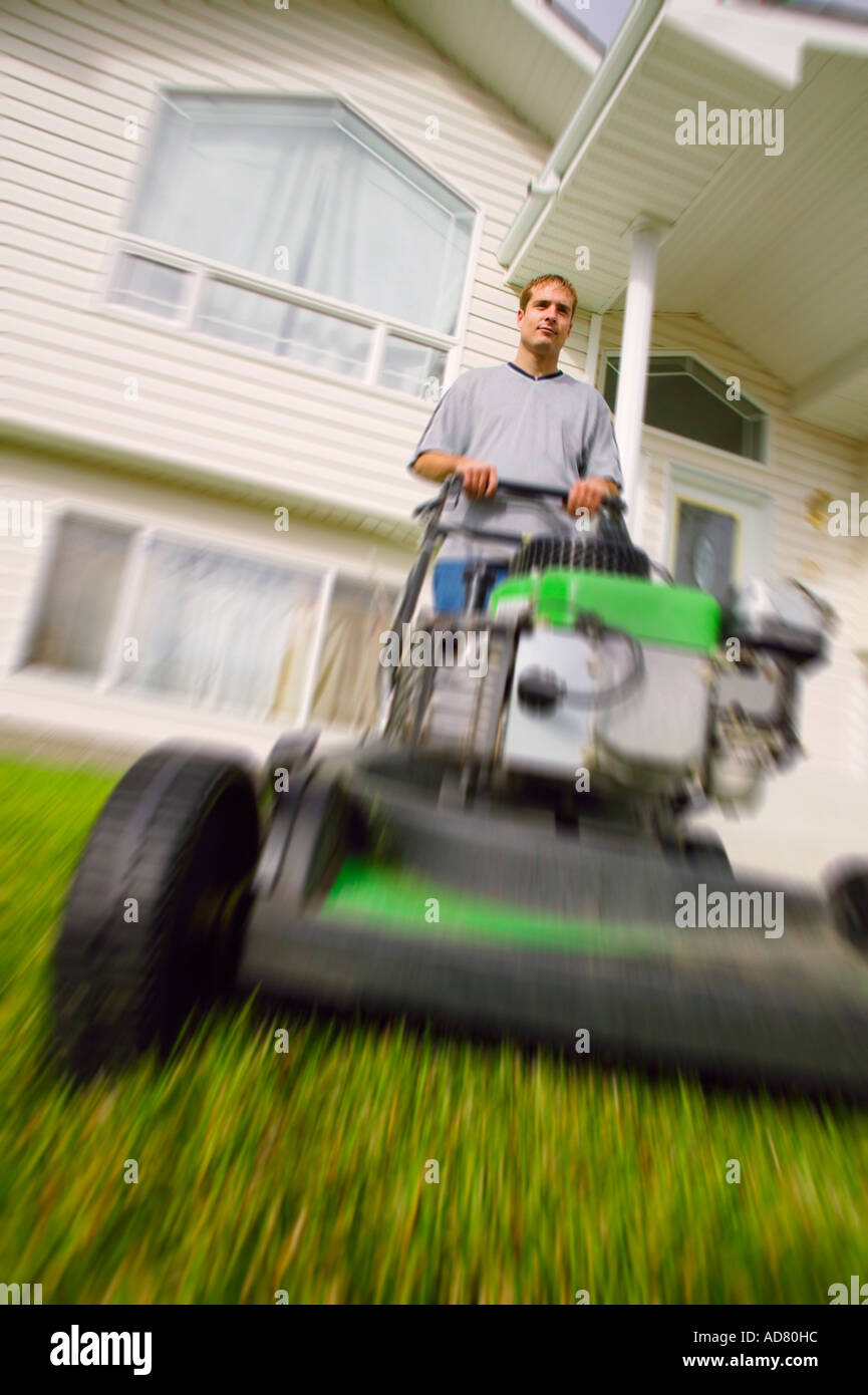 Man mowing lawn low hi-res stock photography and images - Alamy