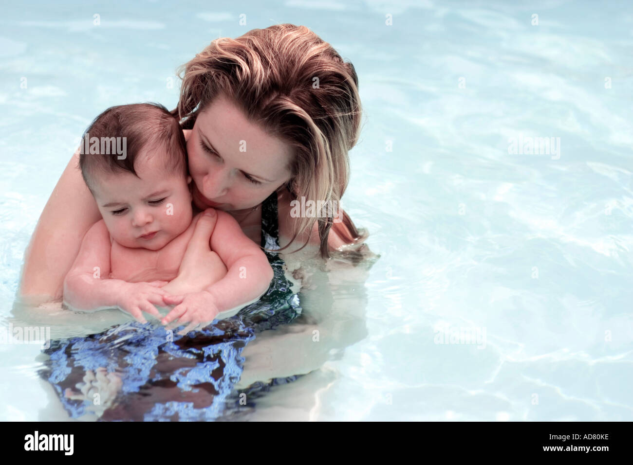 Mother sons in swimming pool hi-res stock photography and images - Alamy