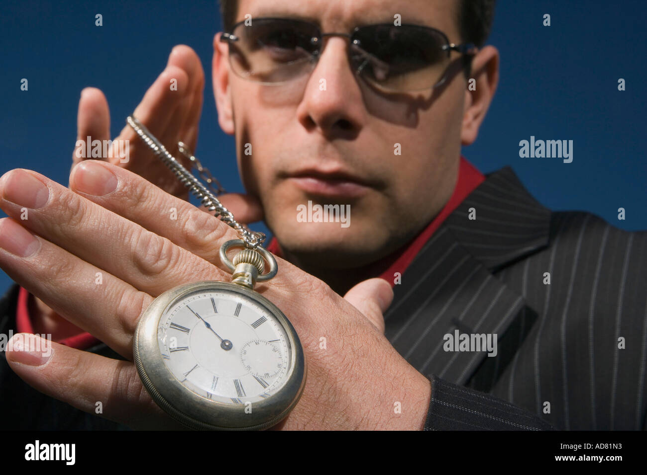 A man with time on his hands Stock Photo - Alamy