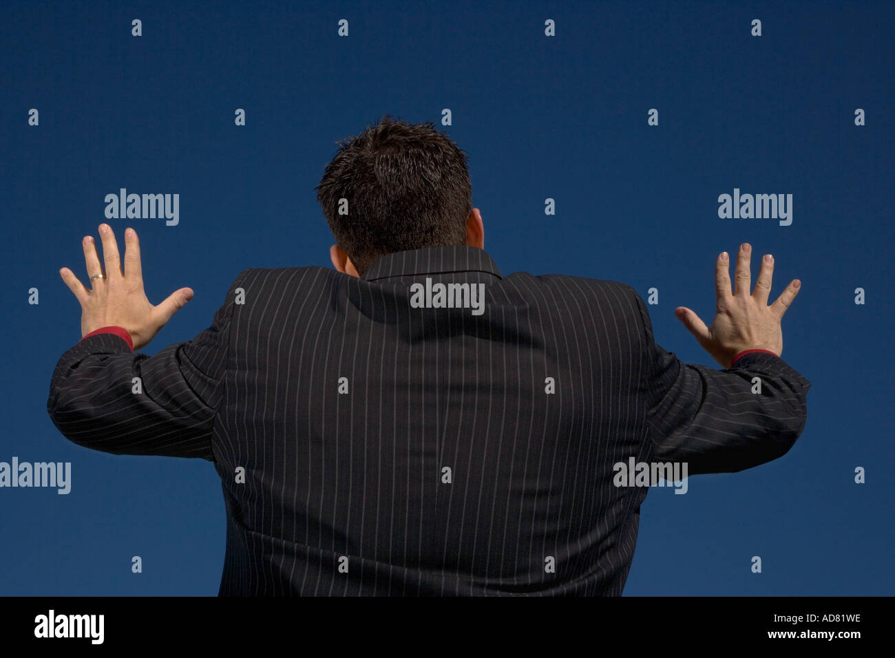 Man with hands outstretched Stock Photo - Alamy