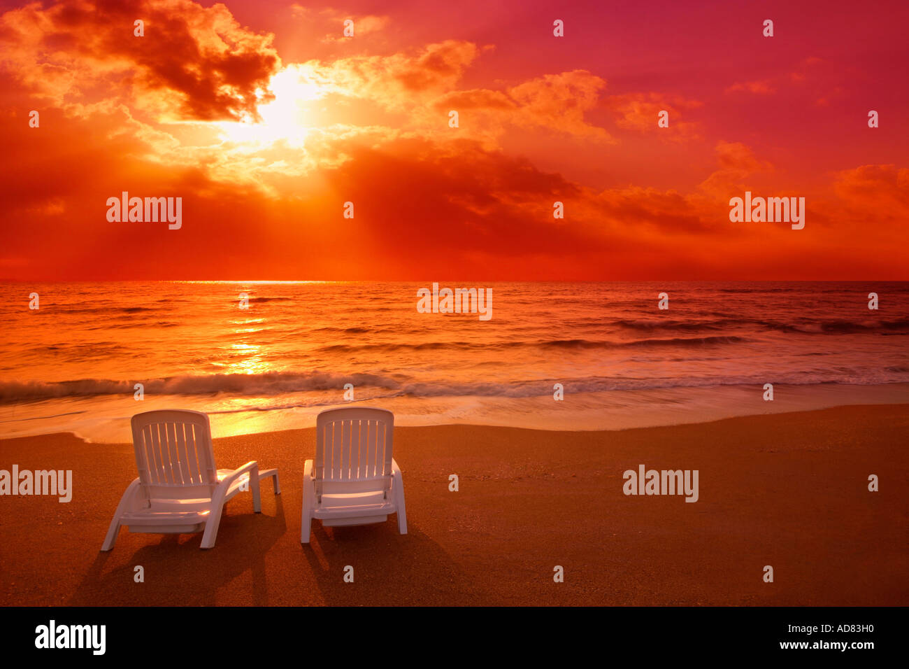 Sunset on beach Stock Photo - Alamy