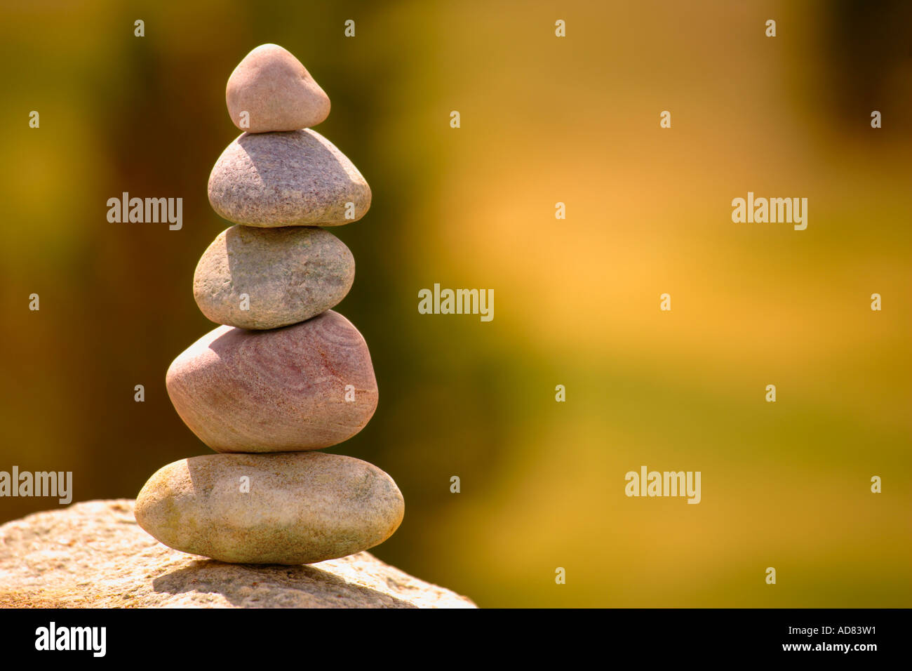 Rocks balanced in a stack Stock Photo - Alamy