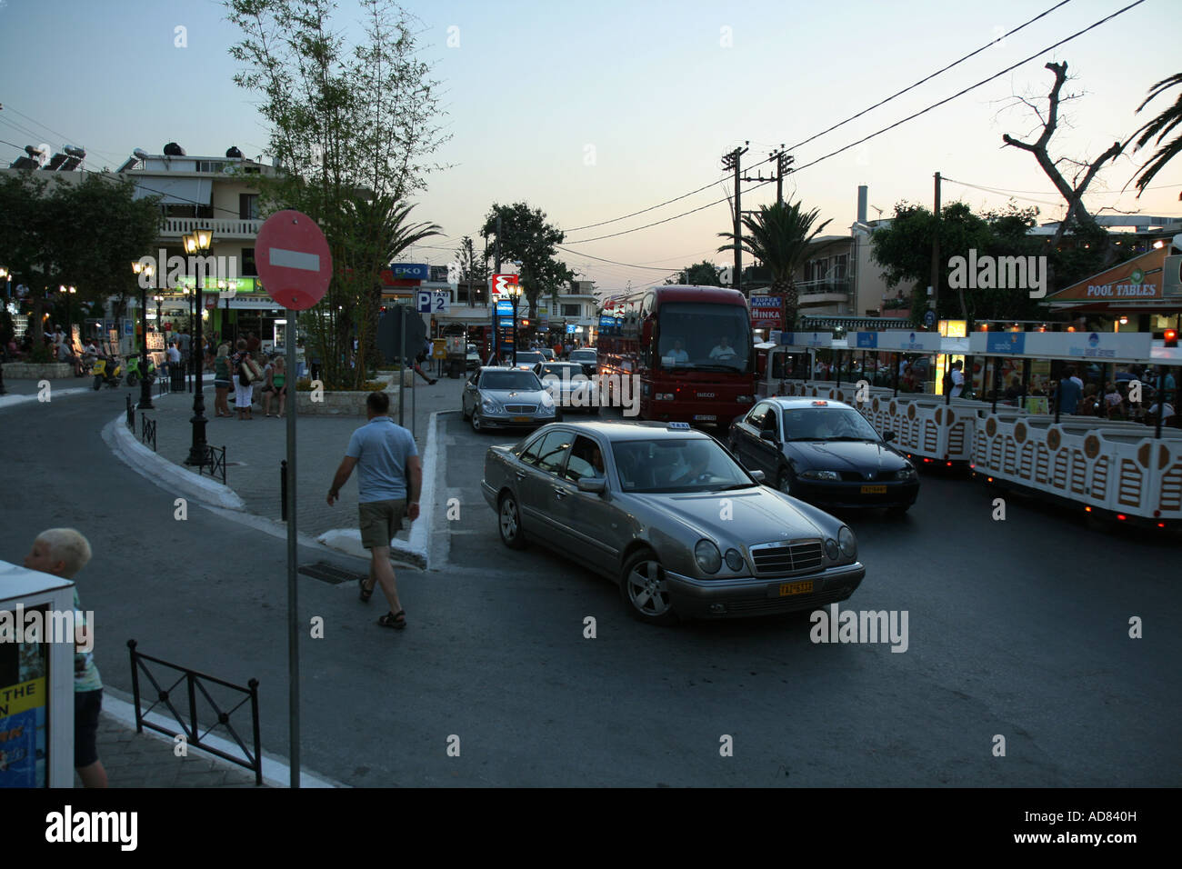 Main square in Platanias at dusk, Crete, Greece Stock Photo - Alamy