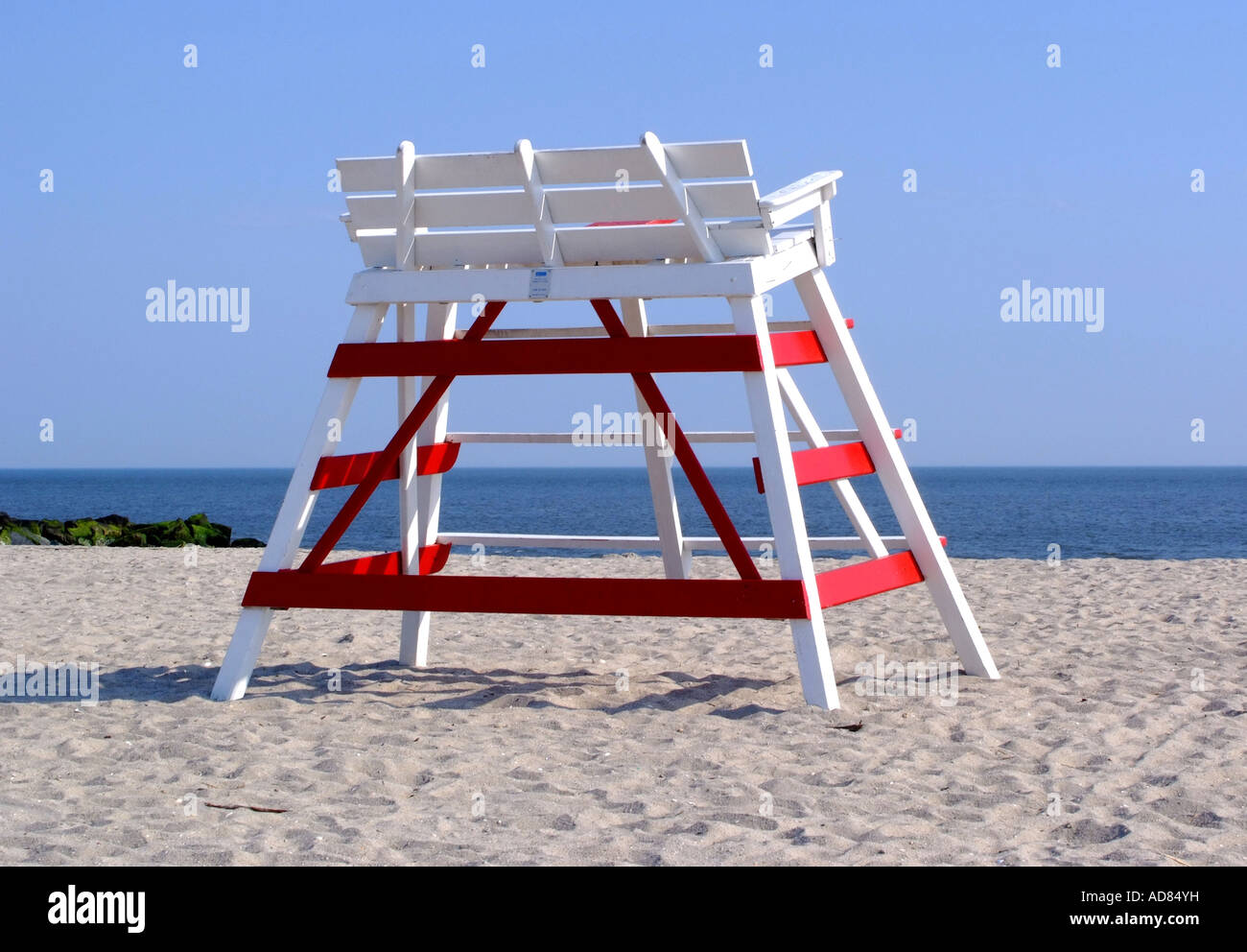 Empty Bright Red And White Lifeguards Chair On Beach At Cape May New