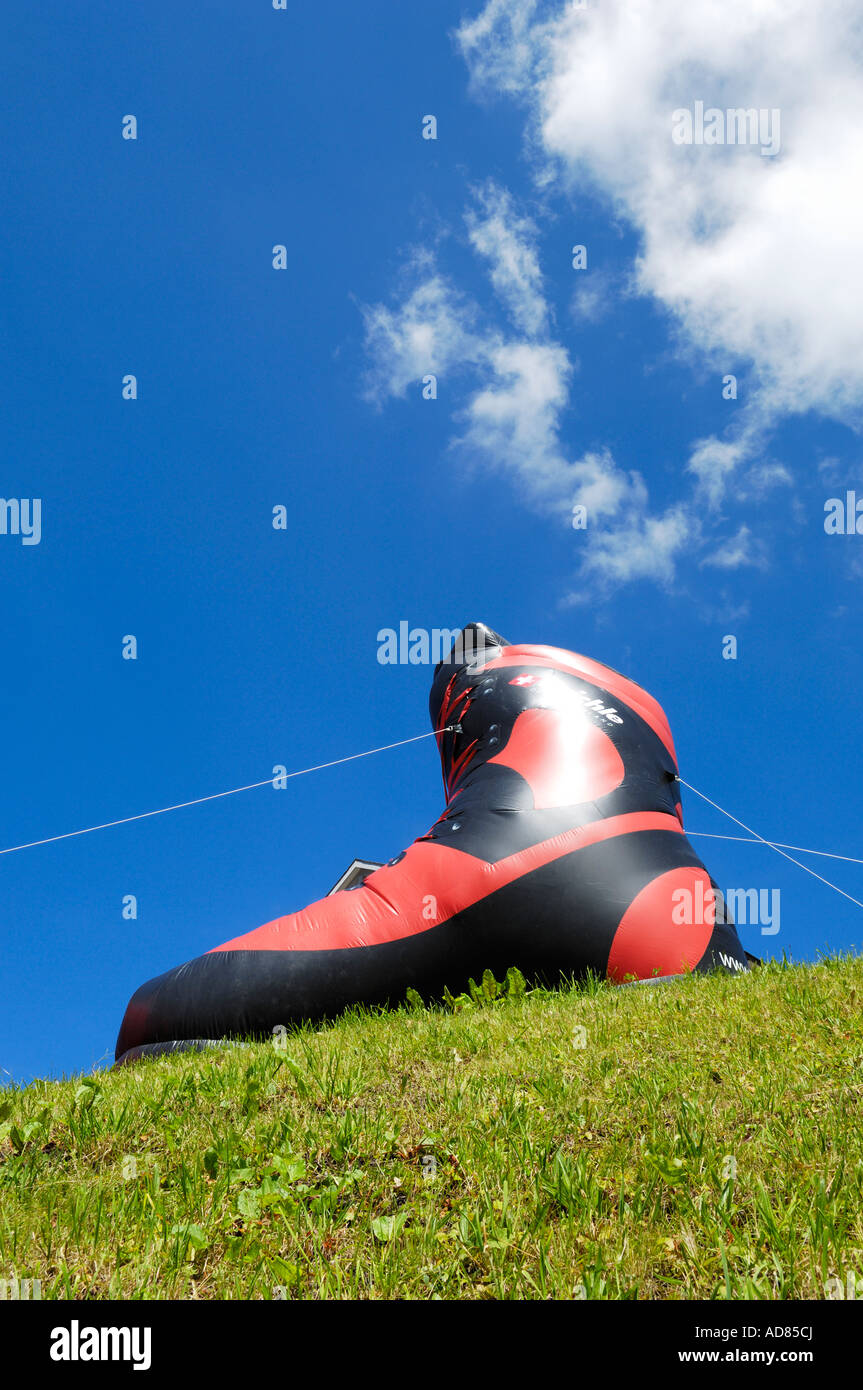 Giant hiking boots (inflated balloon) under a blue summer sky Stock ...