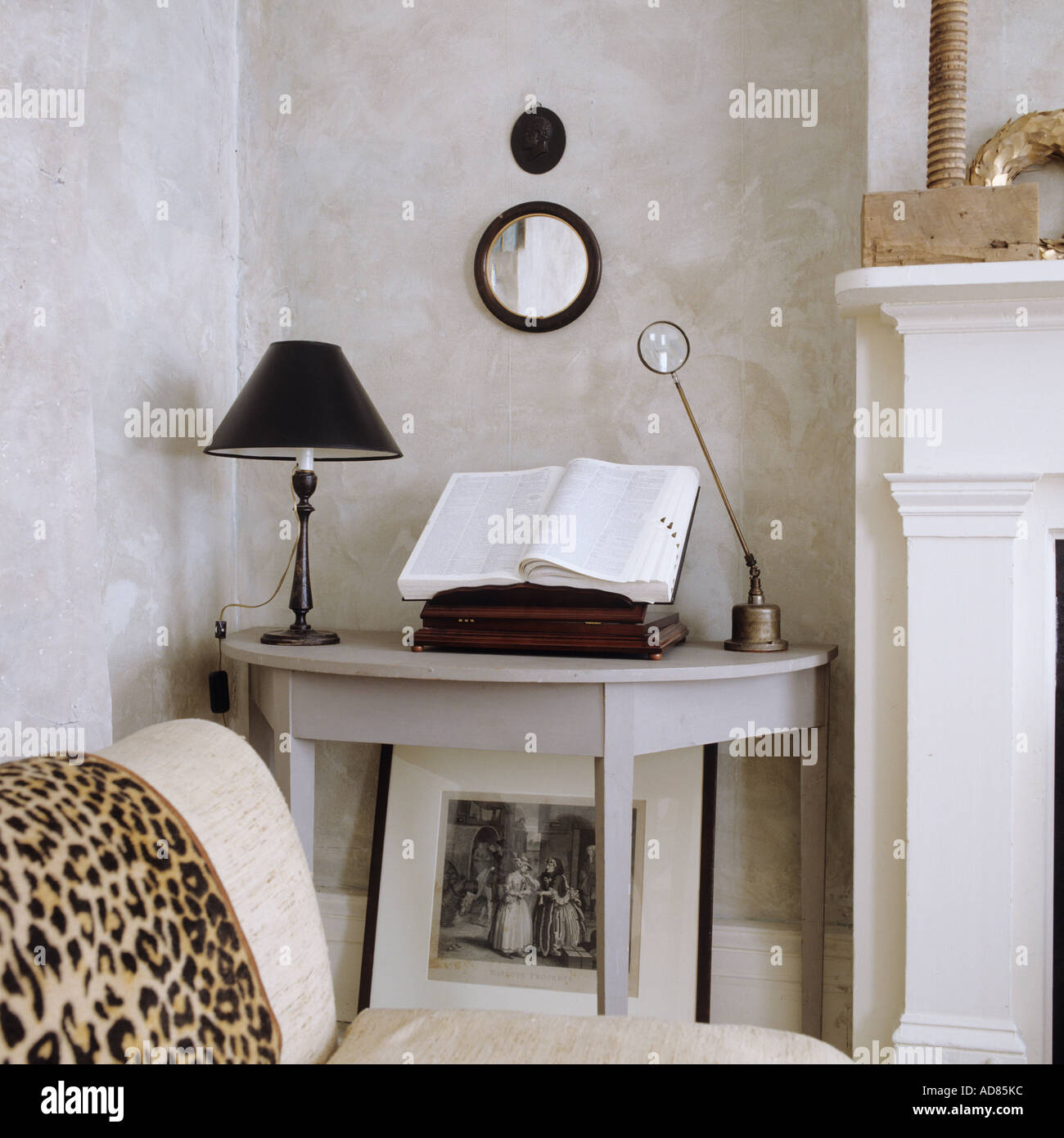 Console table with book stand and magnifying glass Stock Photo - Alamy