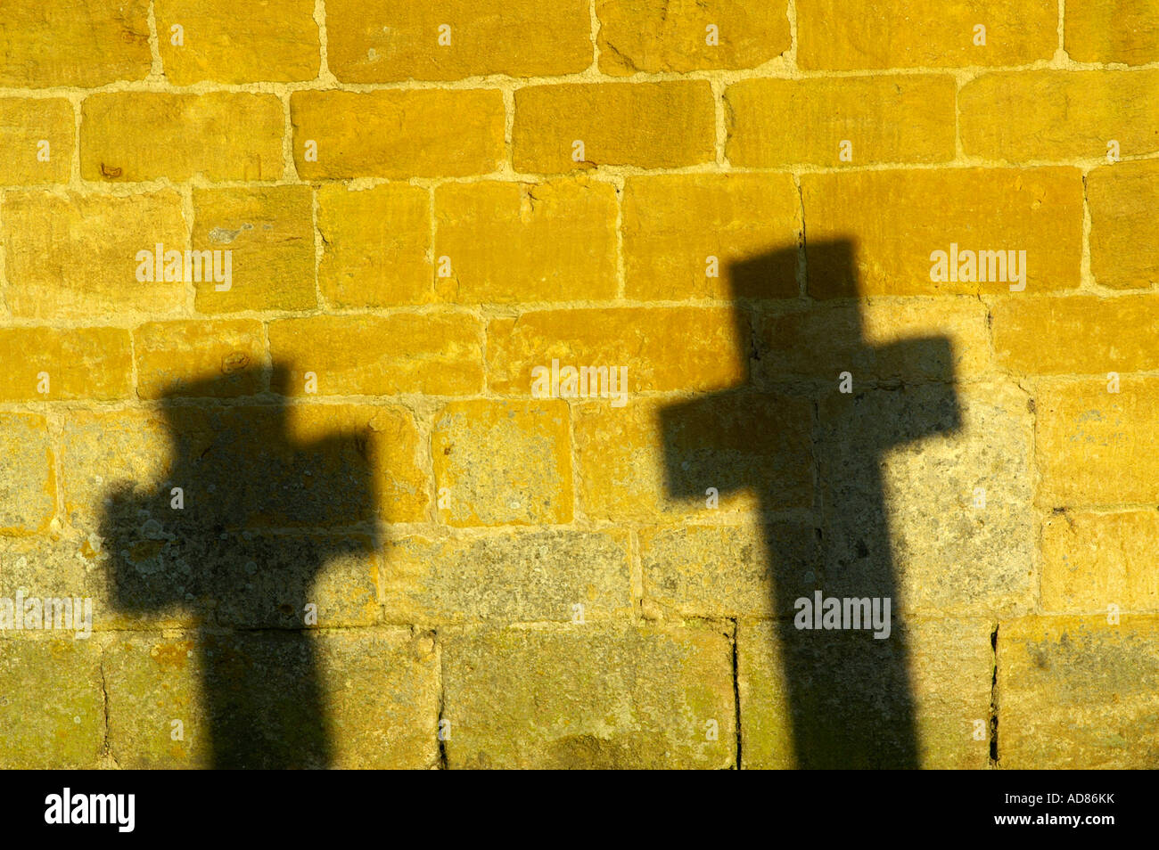 shadows of two crosses on the graveyard Stock Photo - Alamy