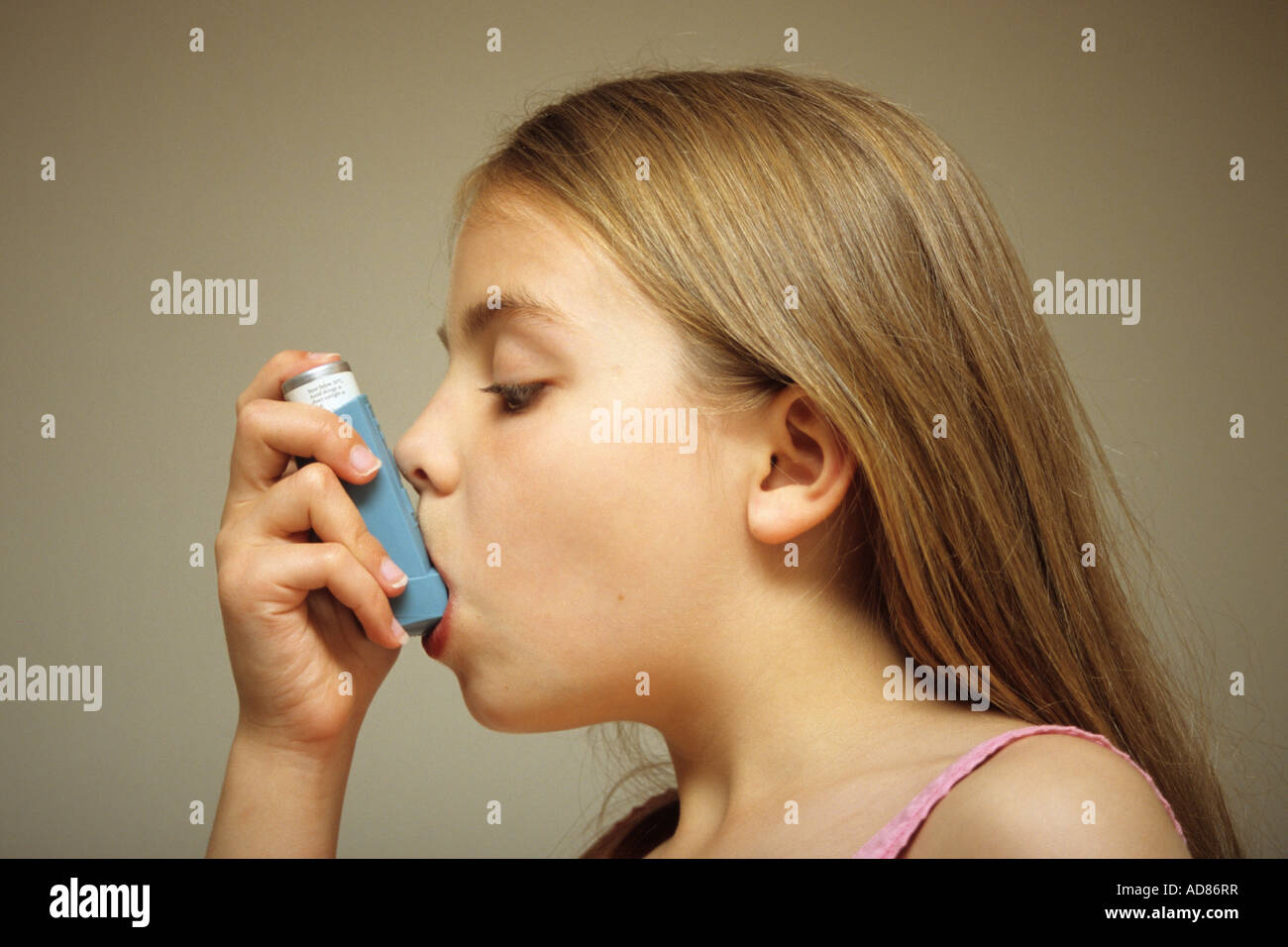 Girl Using Inhaler Stock Photo - Alamy
