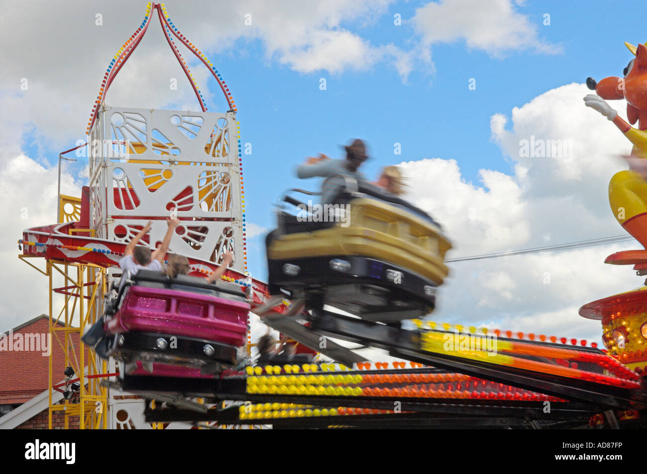 Spinning fairground ride Stock Photo - Alamy