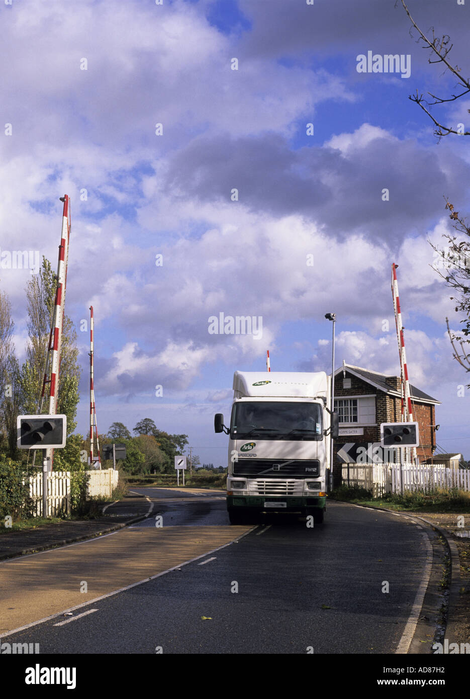 lorry traveling over railway level crossing at thorpe willoughby ...