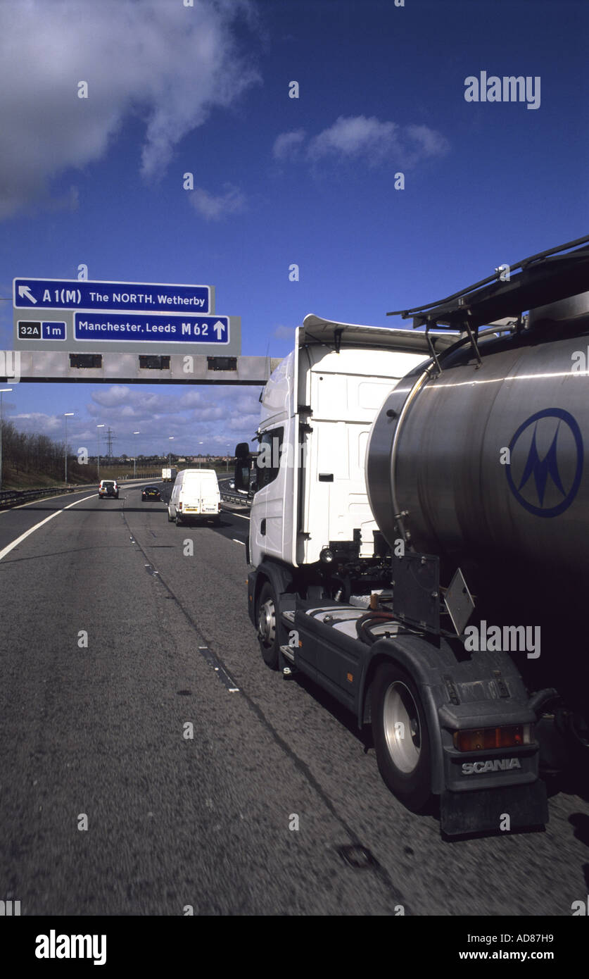tanker lorry travelling under overhead destination gantry on the m62 ...