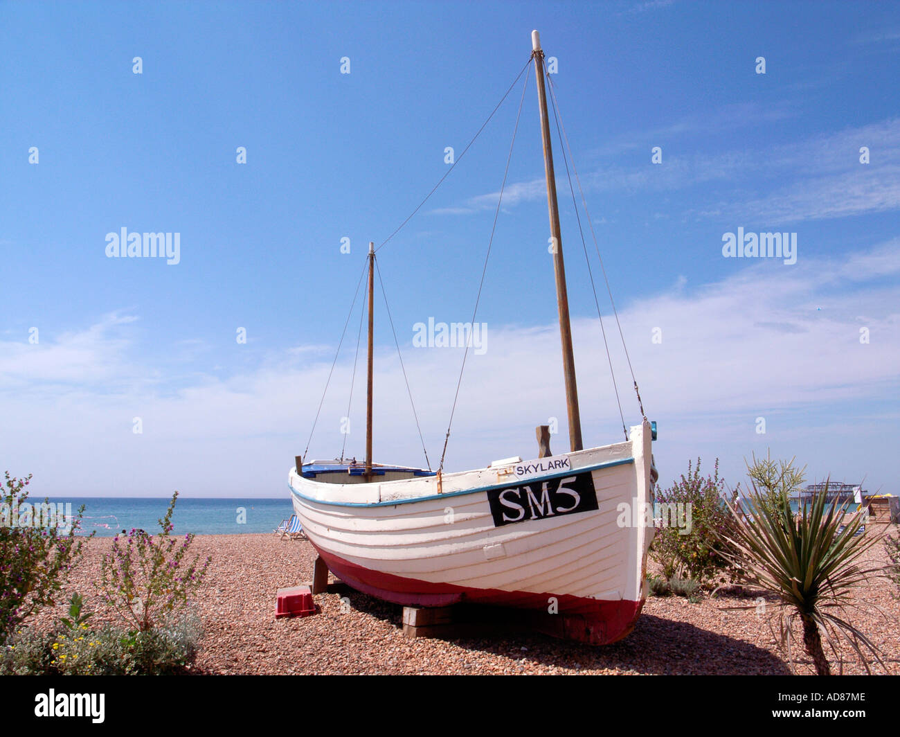 sailing boat on beach Stock Photo - Alamy