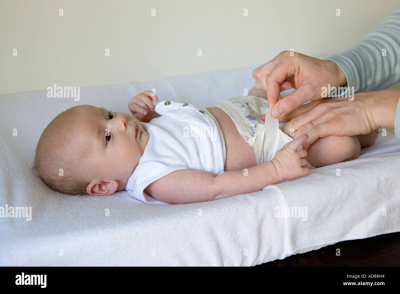 Changing diapers hi-res stock photography and images - Alamy