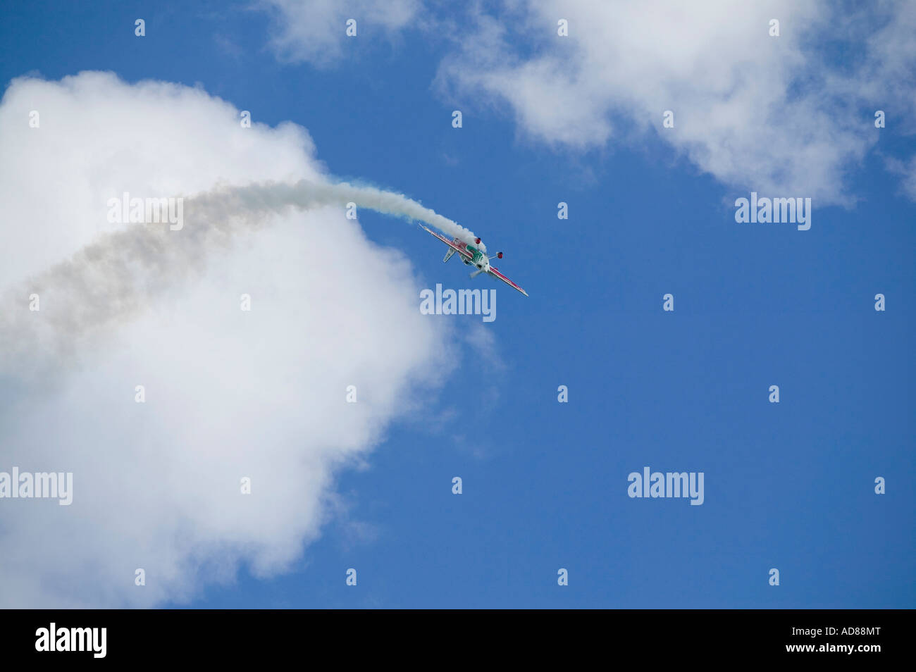 colourful acrobatic aeroplane in the sky Stock Photo - Alamy