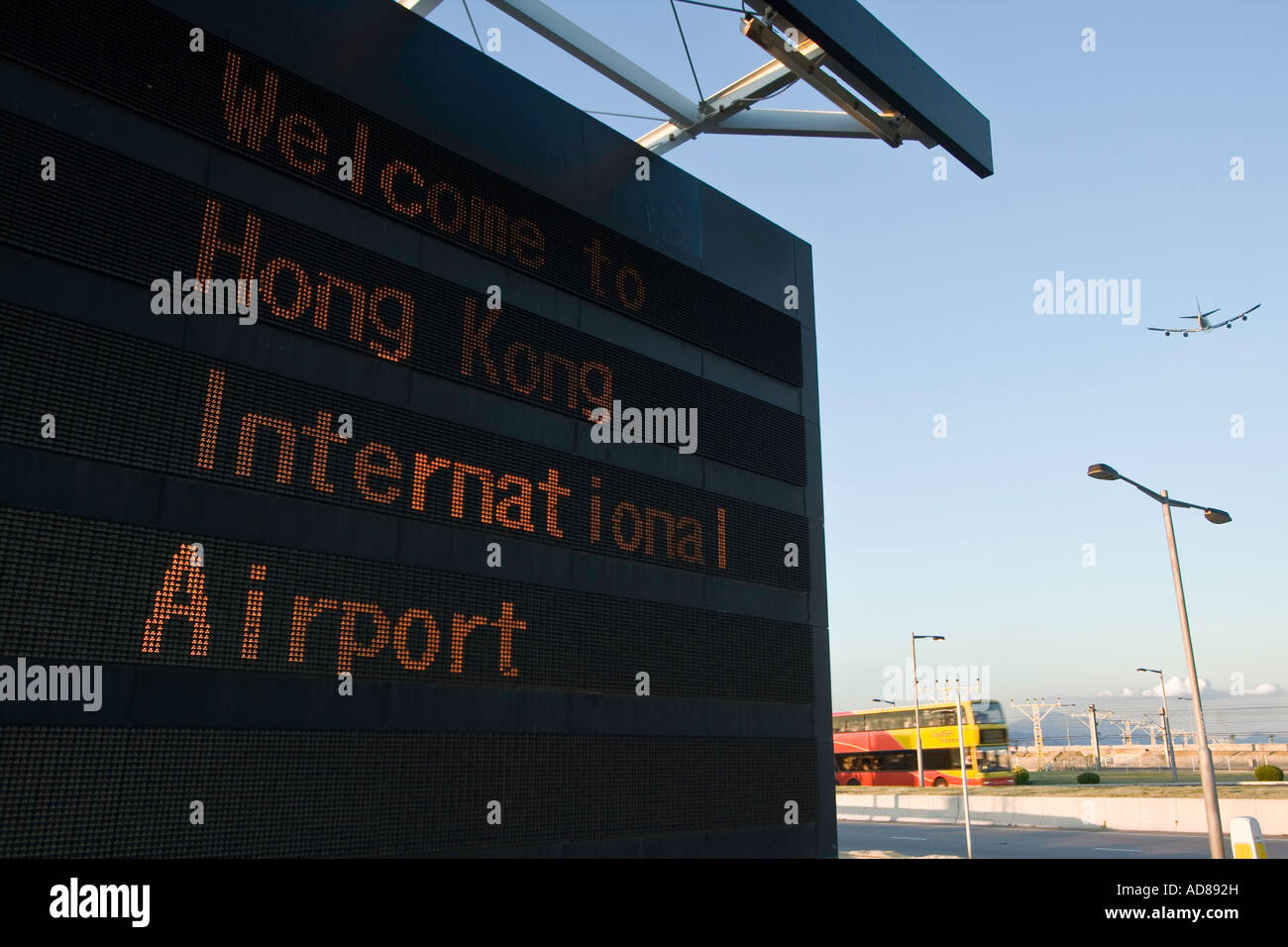 Sign Welcome to Hong Kong International Airport Departing Airplane in ...