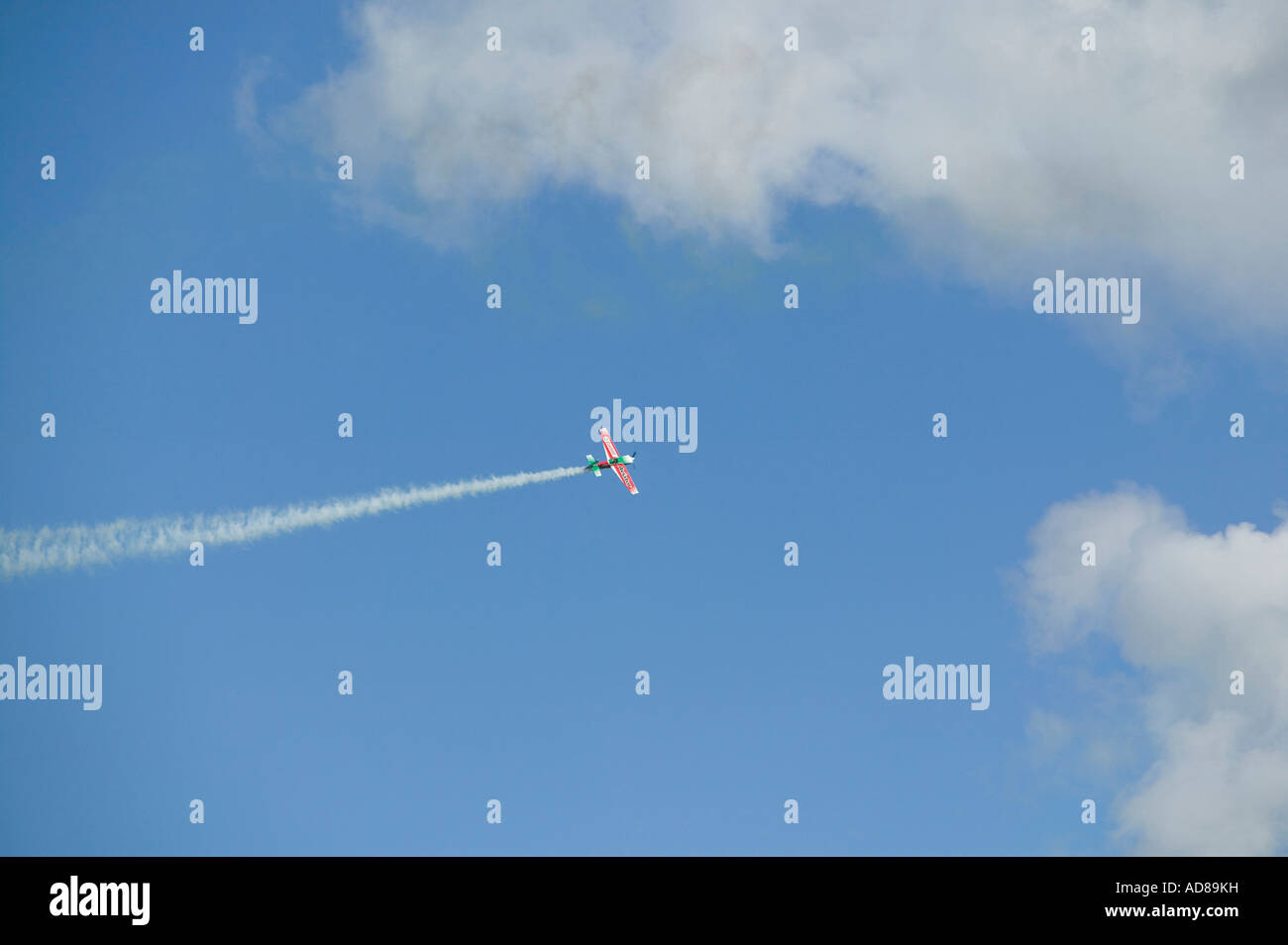 colourful acrobatic aeroplane in the sky Stock Photo - Alamy