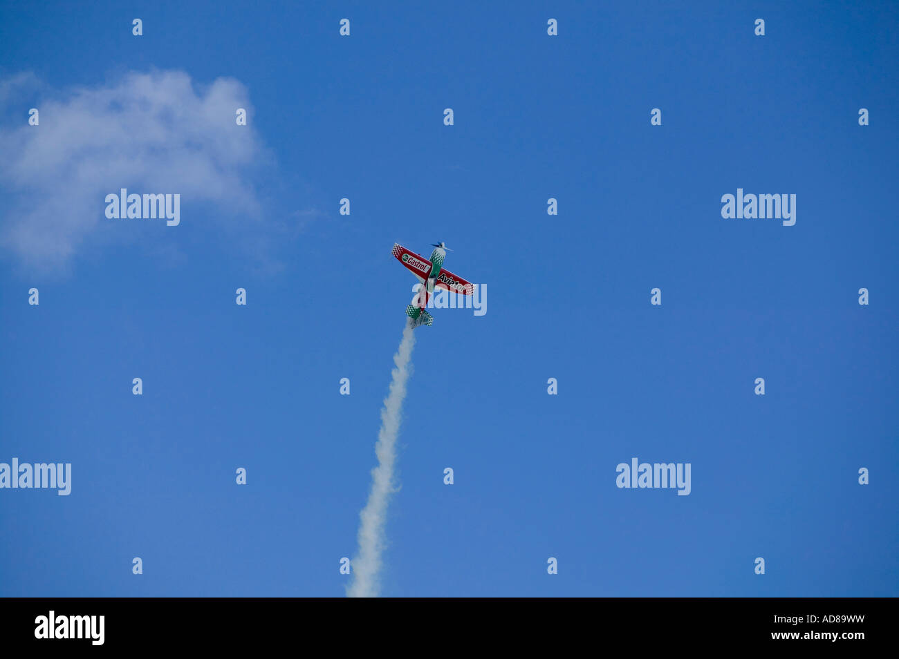 colourful acrobatic aeroplane in the sky Stock Photo - Alamy