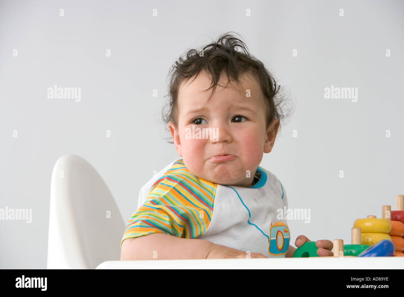 Toddler with a sulky expression Stock Photo - Alamy