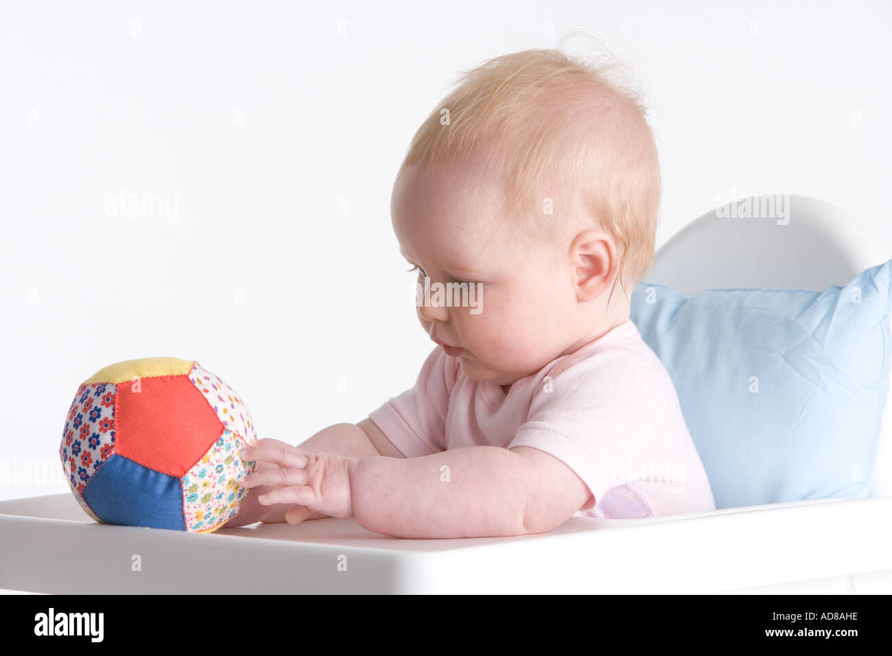 Baby plays with a ball Stock Photo - Alamy