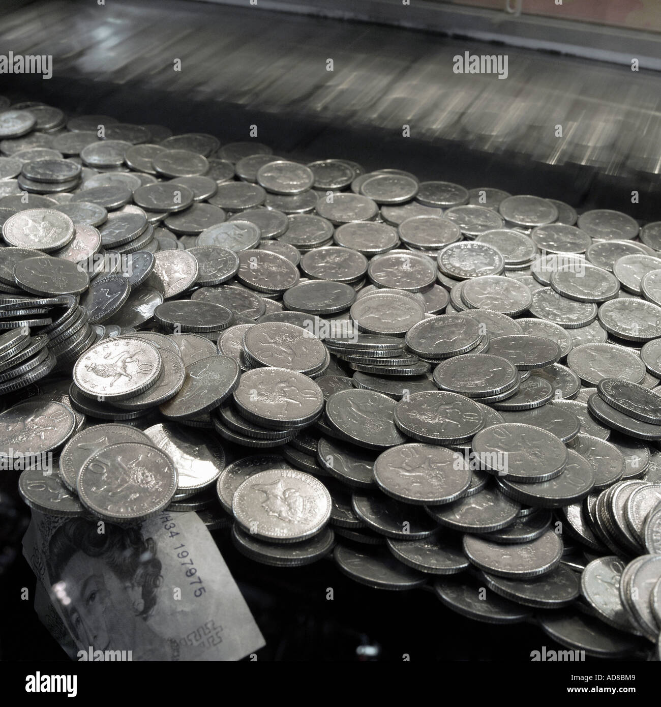 Coin pushing machine Stock Photo - Alamy
