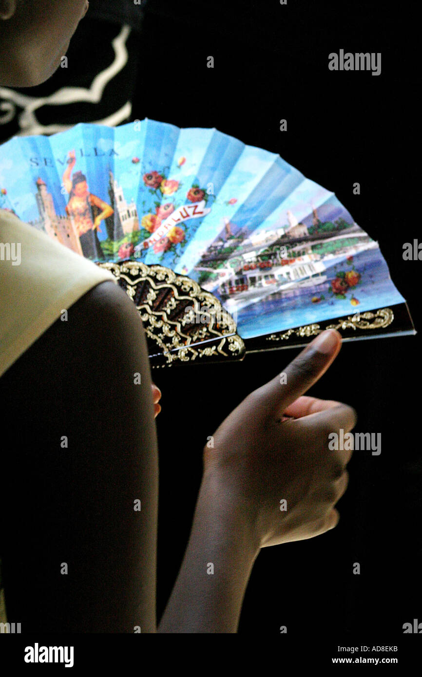 Woman fanning herself hi-res stock photography and images - Alamy