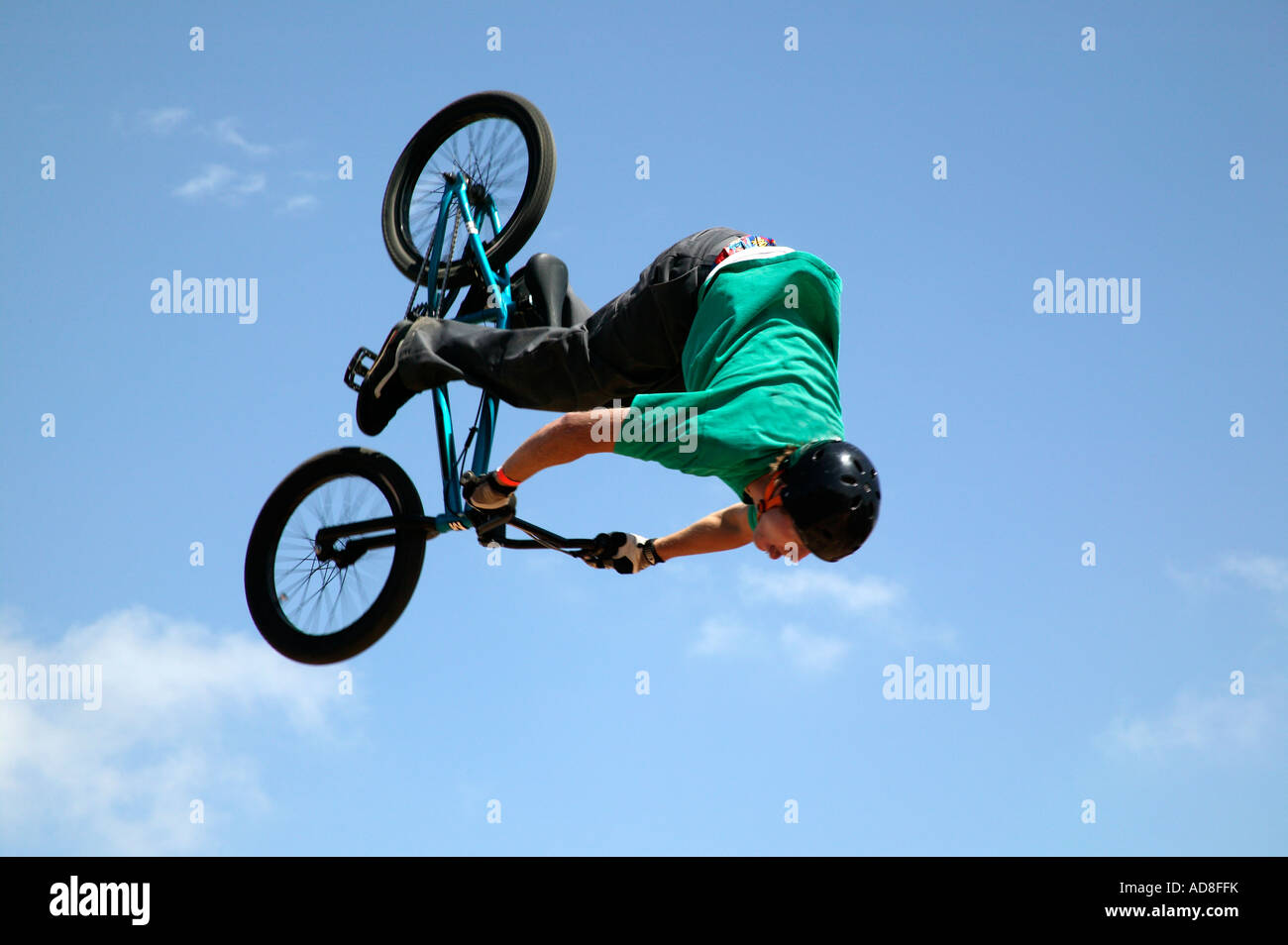 acrobatic bikers doing high jumps Stock Photo - Alamy