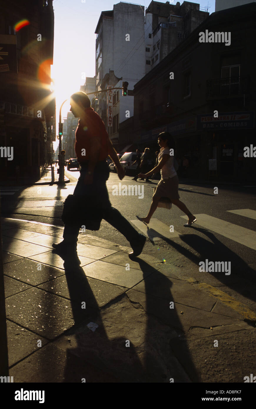 Walking across busy street hi-res stock photography and images - Alamy