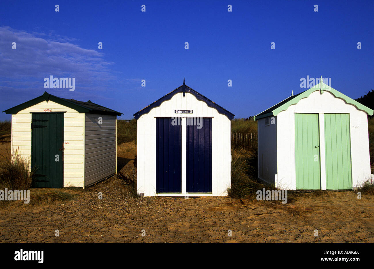 Brightly painted beach huts southwold hi-res stock photography and ...