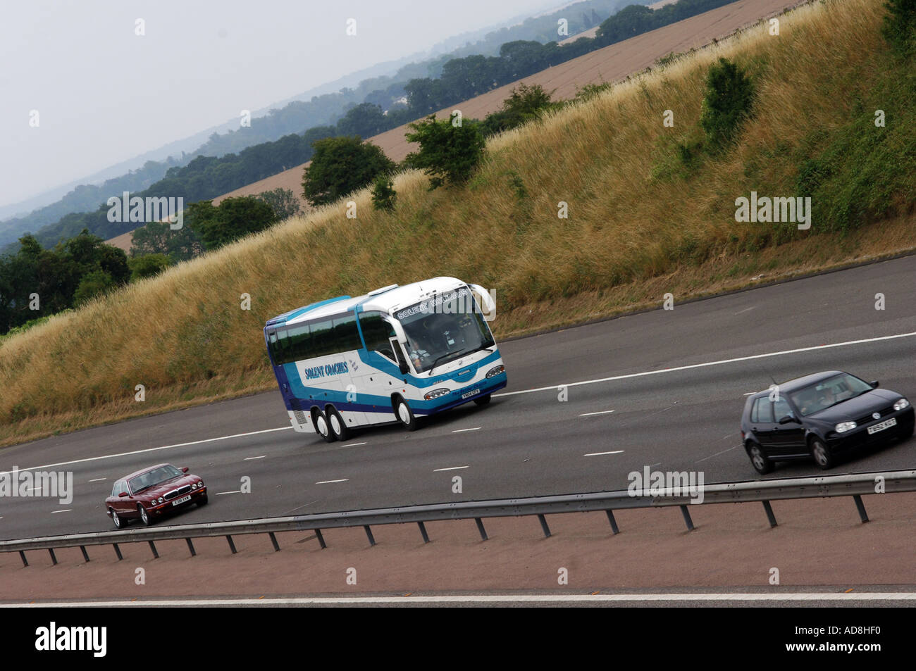 Bus or Coach on the M3 Motorway Stock Photo - Alamy