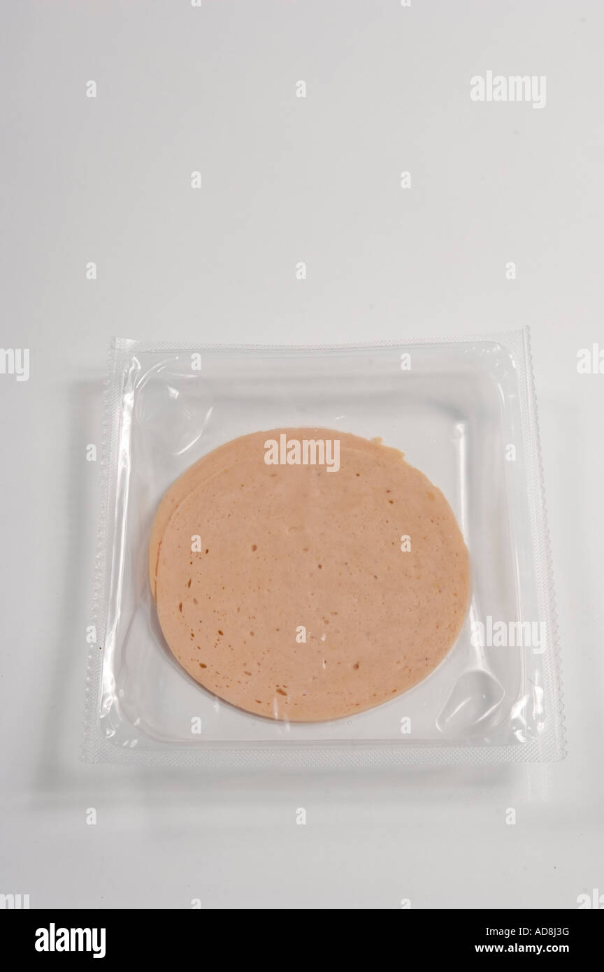 Plastic pack of processed ham Stock Photo - Alamy