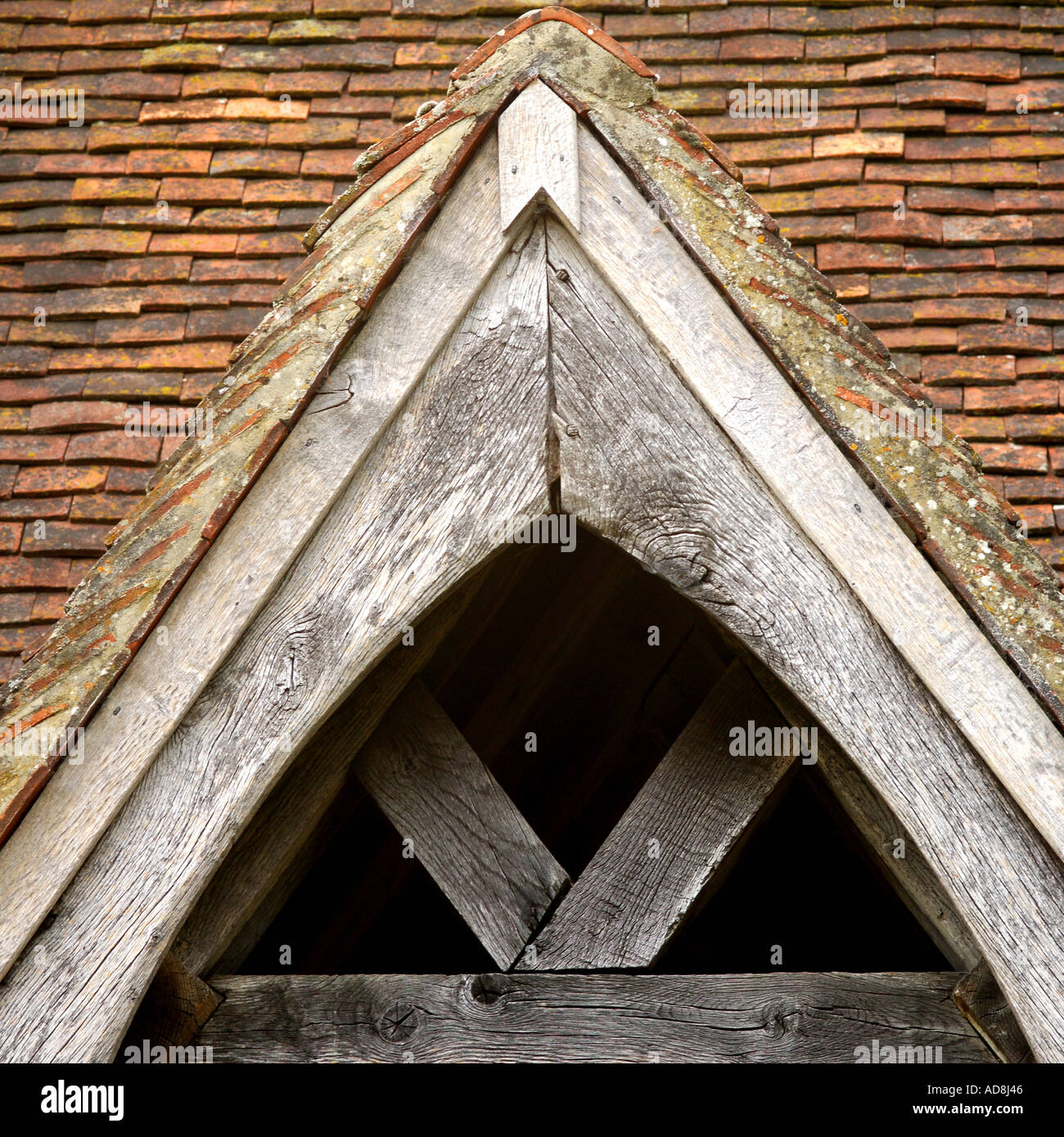 Timber framed church porch and rooftop Stock Photo - Alamy