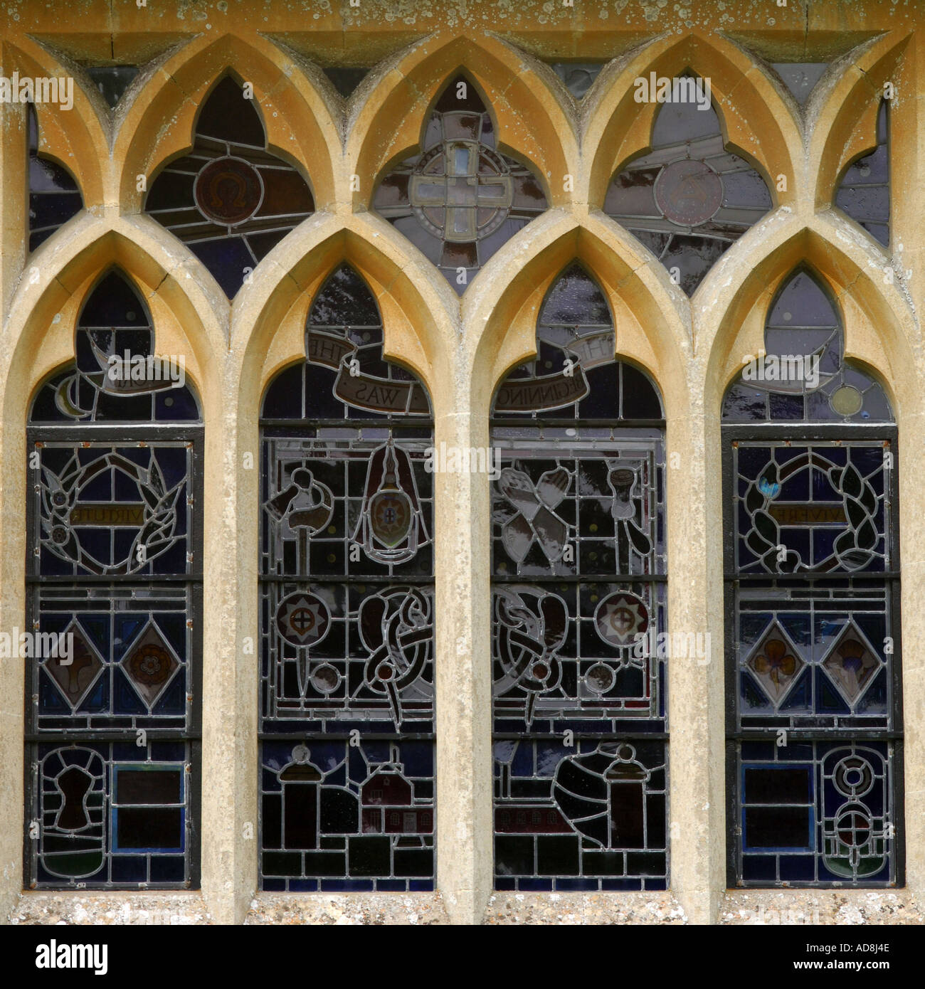 Mullioned church windows with stained glass viewed from outside Stock ...
