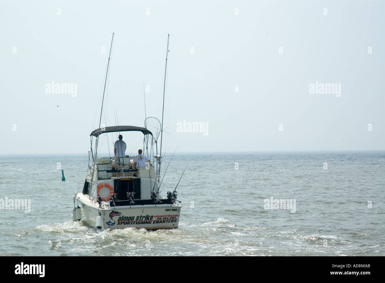 Fishing boat heading out to sea Stock Photo - Alamy Fishing boat heading out to sea Stock Photo - Alamy