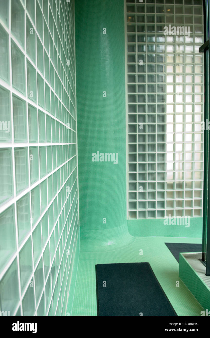 hallway with green walls and window mosaic Stock Photo - Alamy