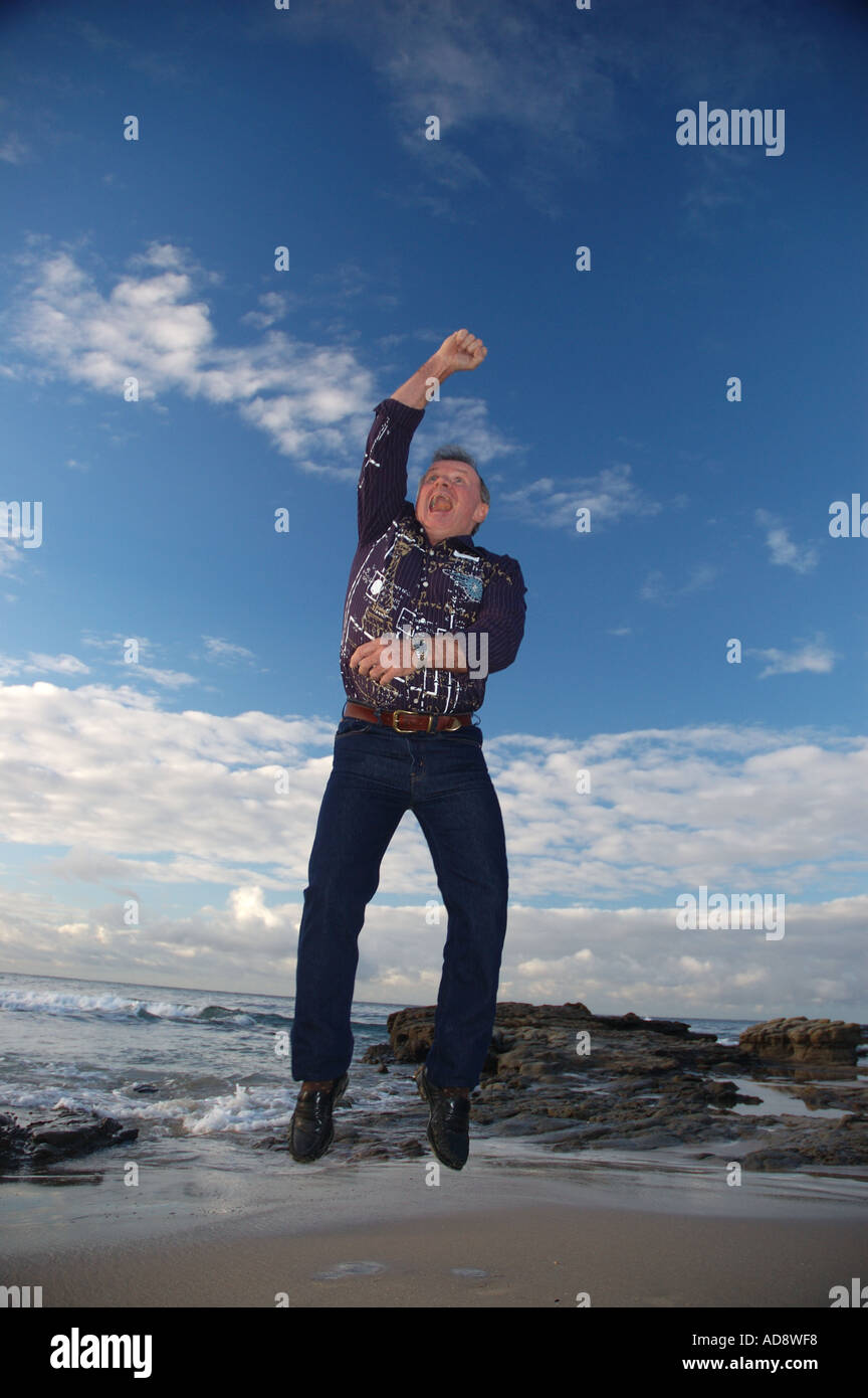 70 year old man jumps with vitality dsca 4686 Stock Photo - Alamy