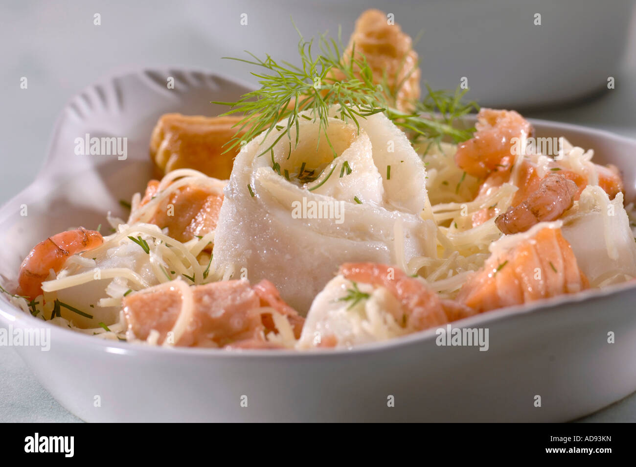 Mixed fish and seafood on spaghetti Stock Photo - Alamy