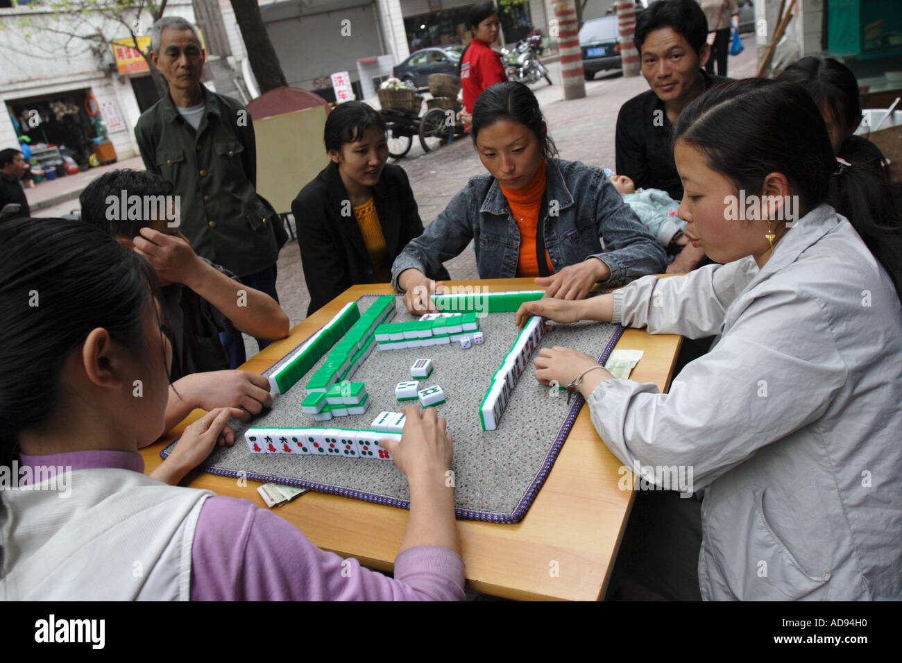 Women playing mahjong hi-res stock photography and images - Alamy