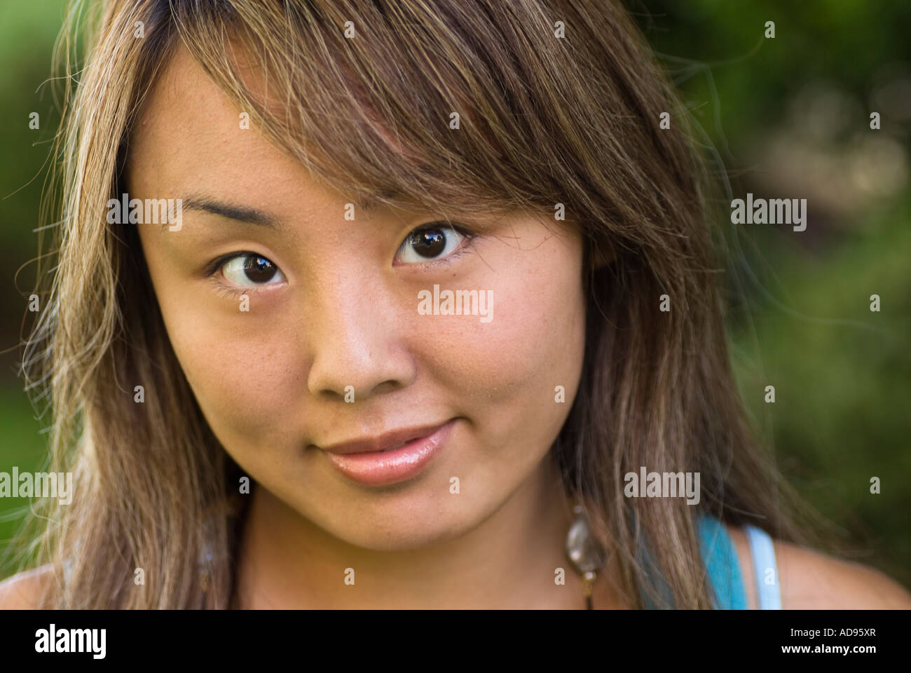 Headshot of a pretty young Asian woman Stock Photo - Alamy