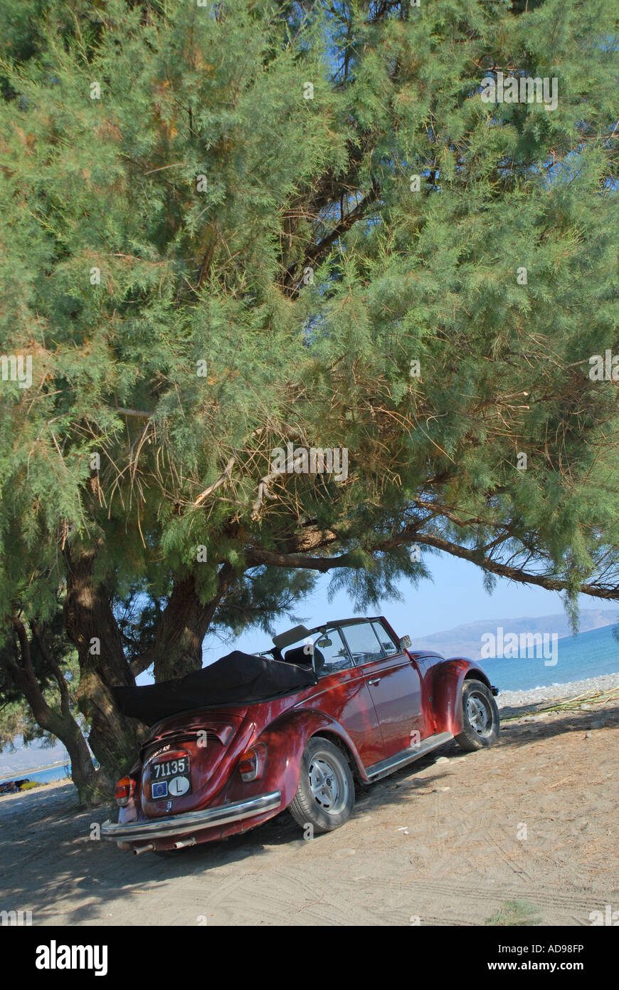 CRETE Car on the beach at Maleme near Hania on Crete's north-west coast ...
