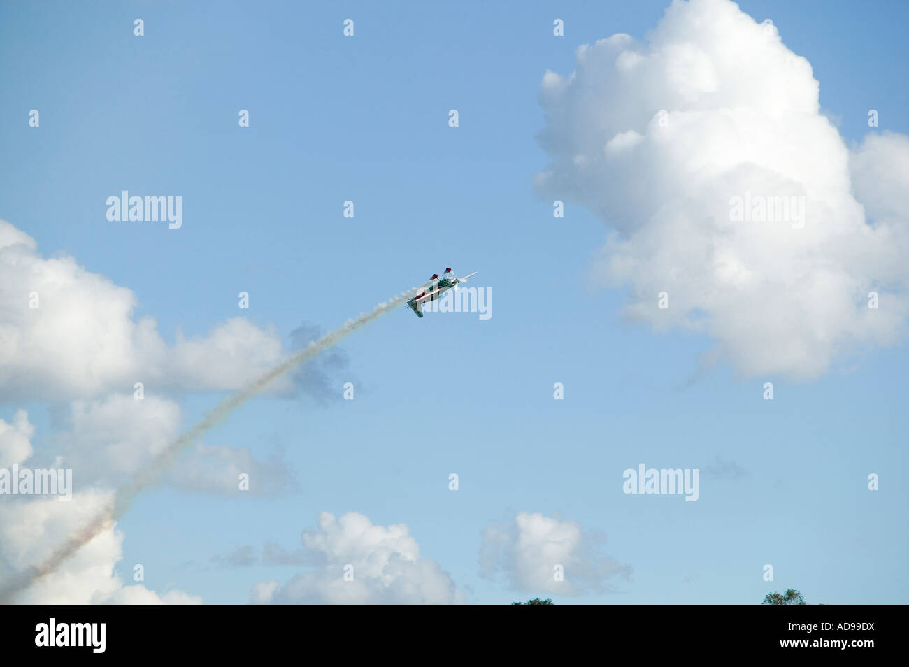colourful acrobatic aeroplane in the sky Stock Photo - Alamy