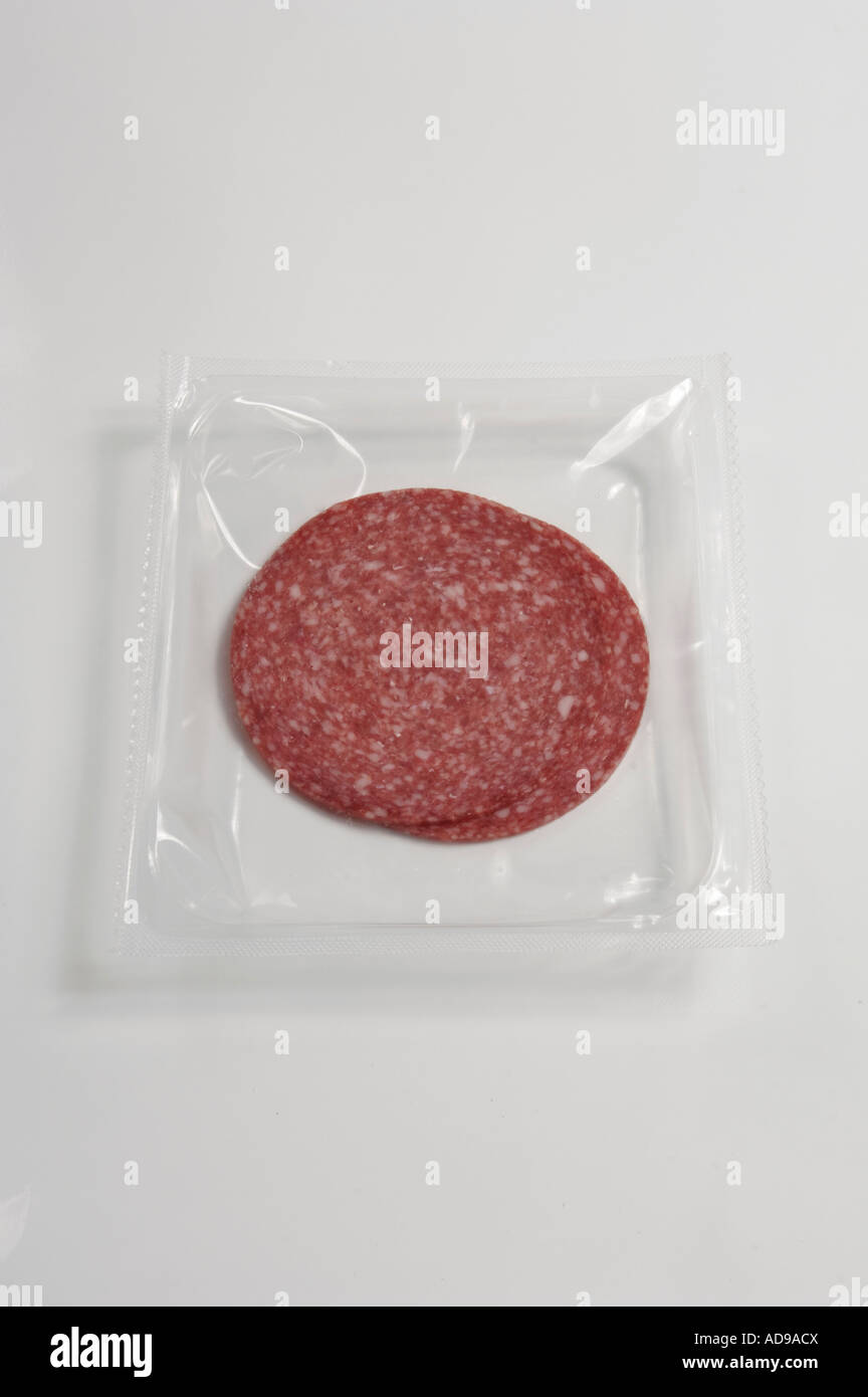 Plastic pack of sliced salami Stock Photo - Alamy