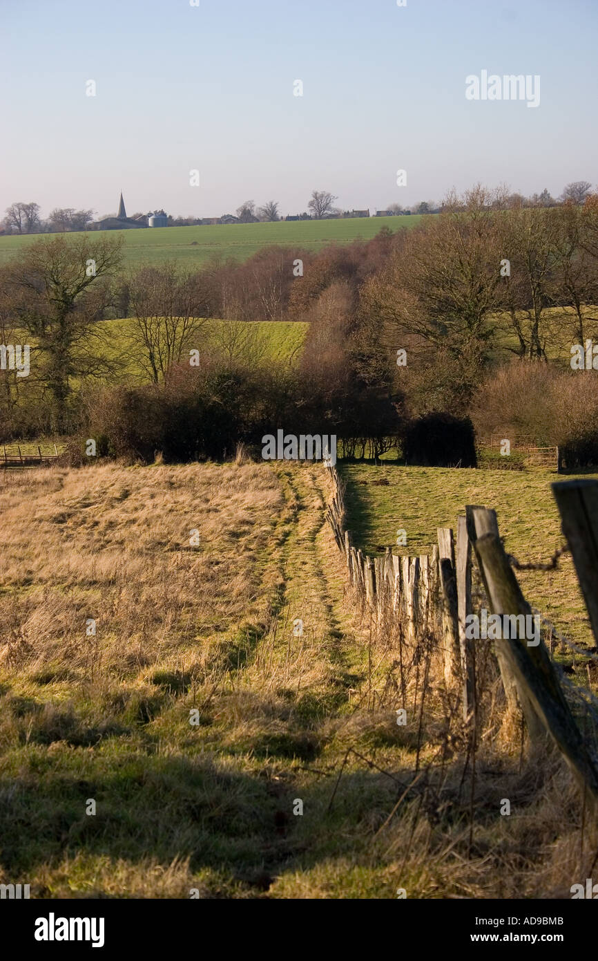 Fence in a field Stock Photo - Alamy